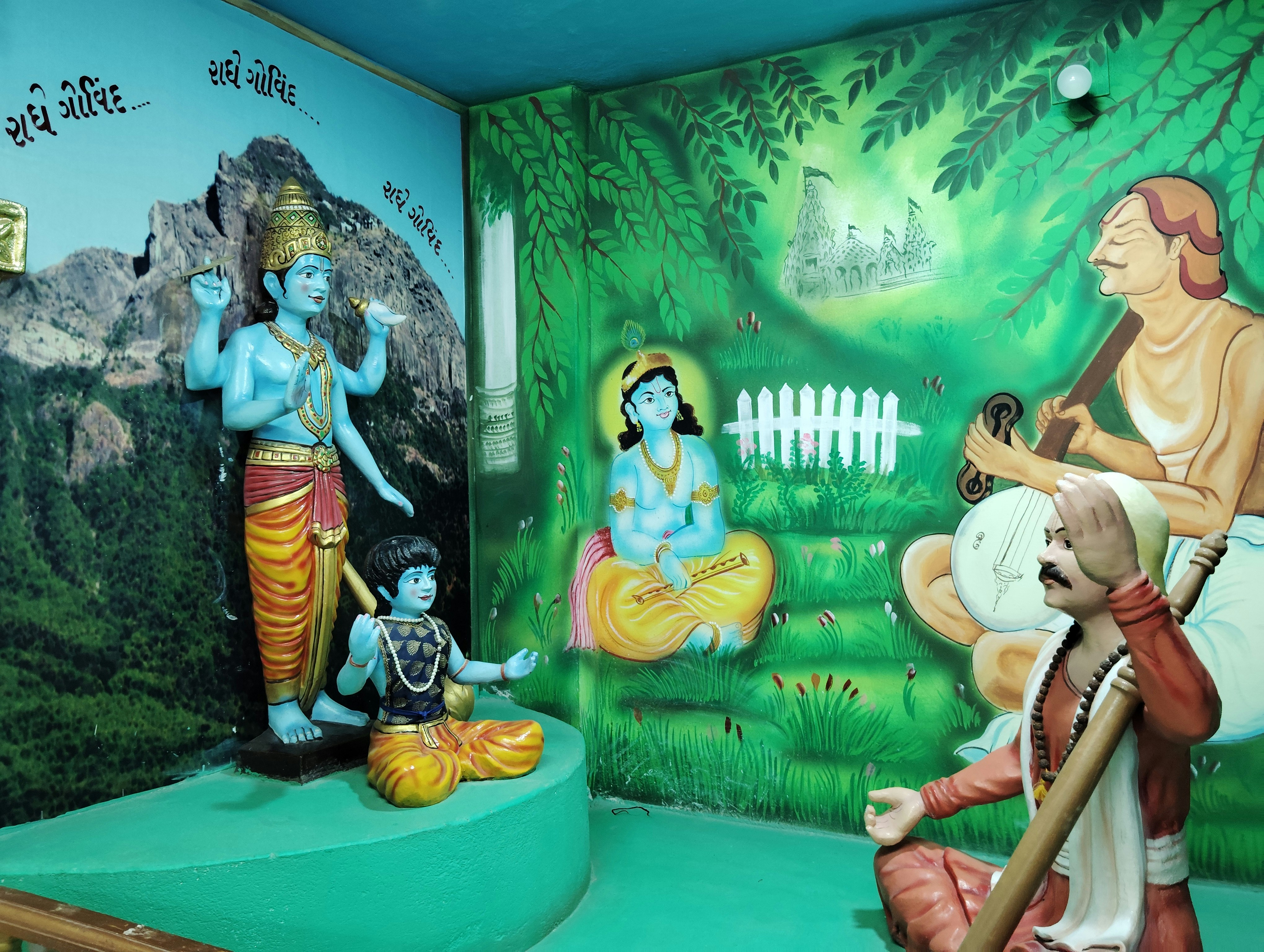 A child's play room with a mural of hindu deities photo – Free Woman ...