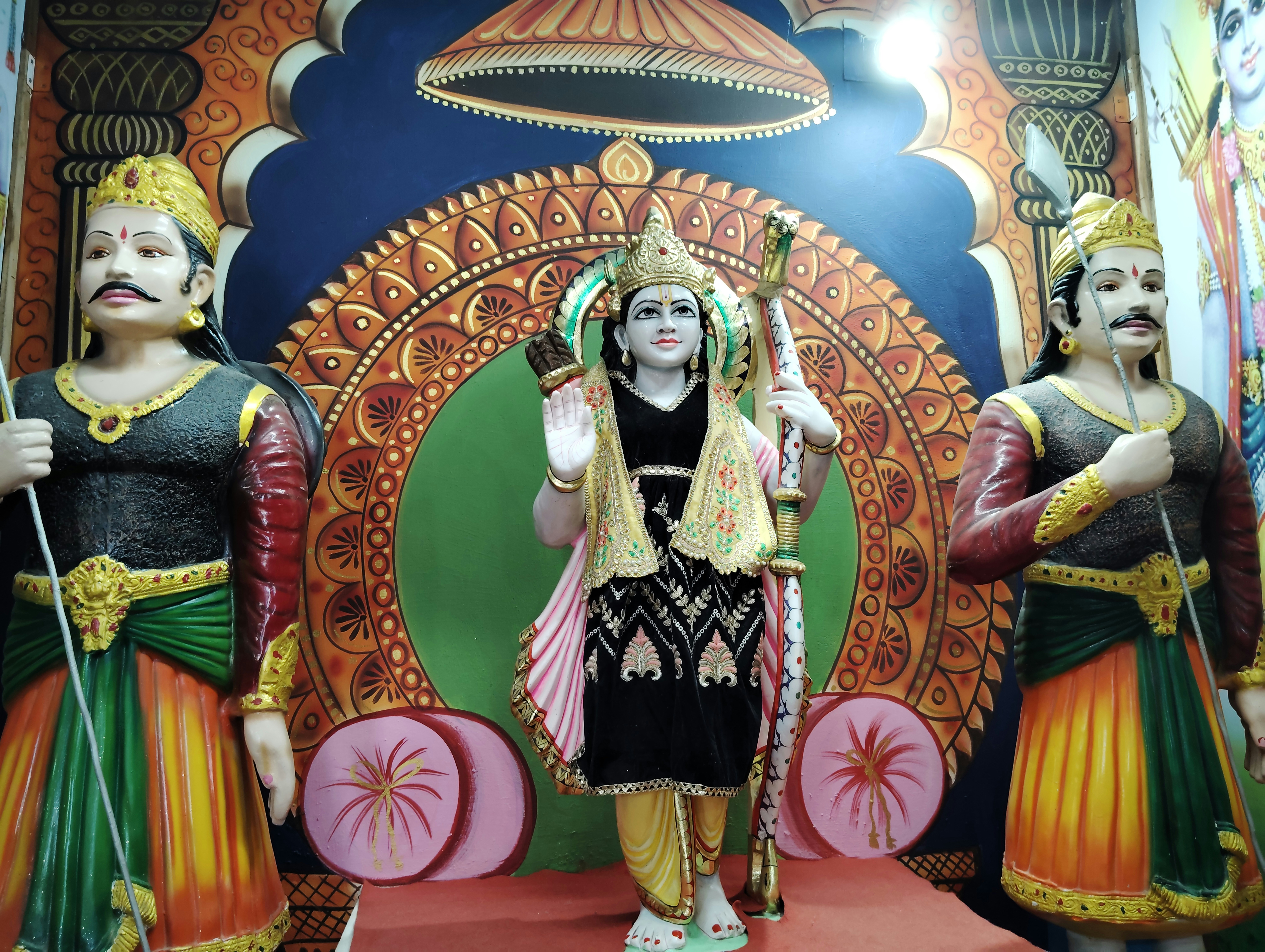 A group of statues of people standing on a stage photo – Free Adult ...