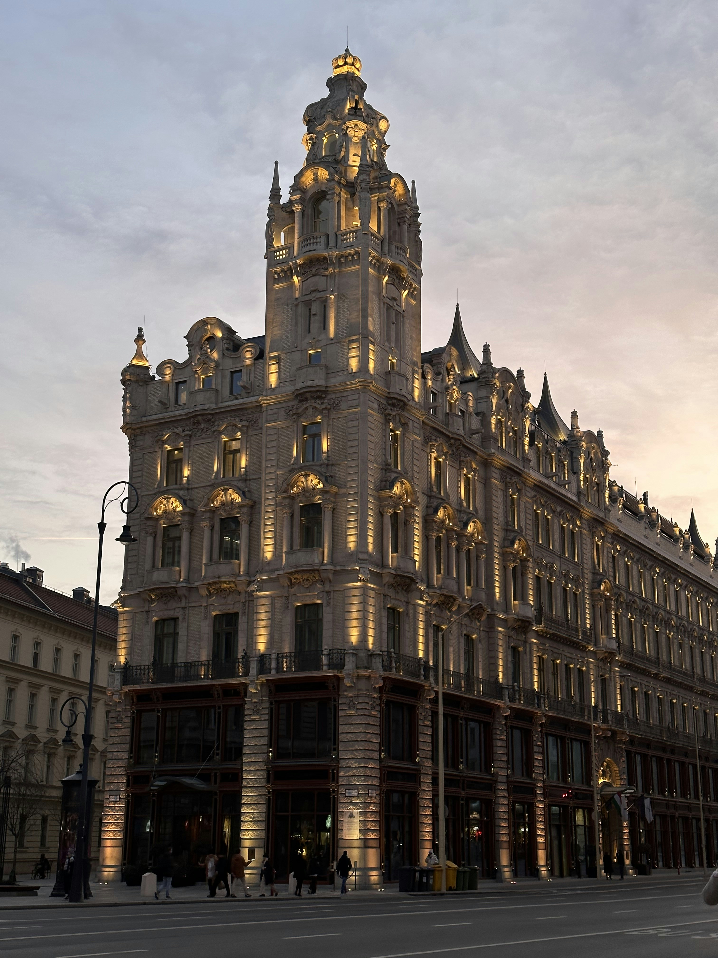 Gilded Corner at Twilight: Neo-Renaissance Façade in Light