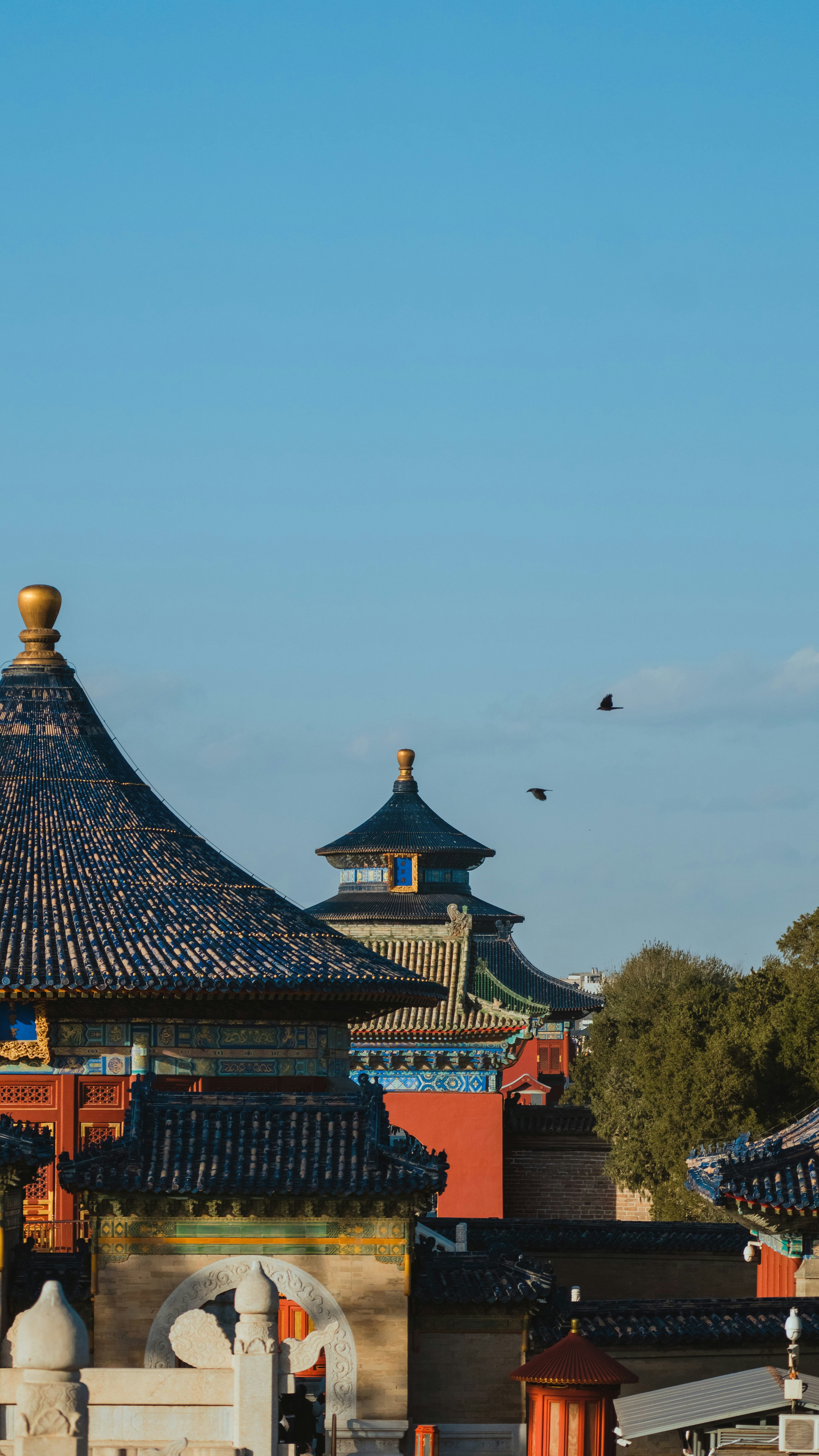 A large building with a clock tower on top of it photo – Free Beijing ...