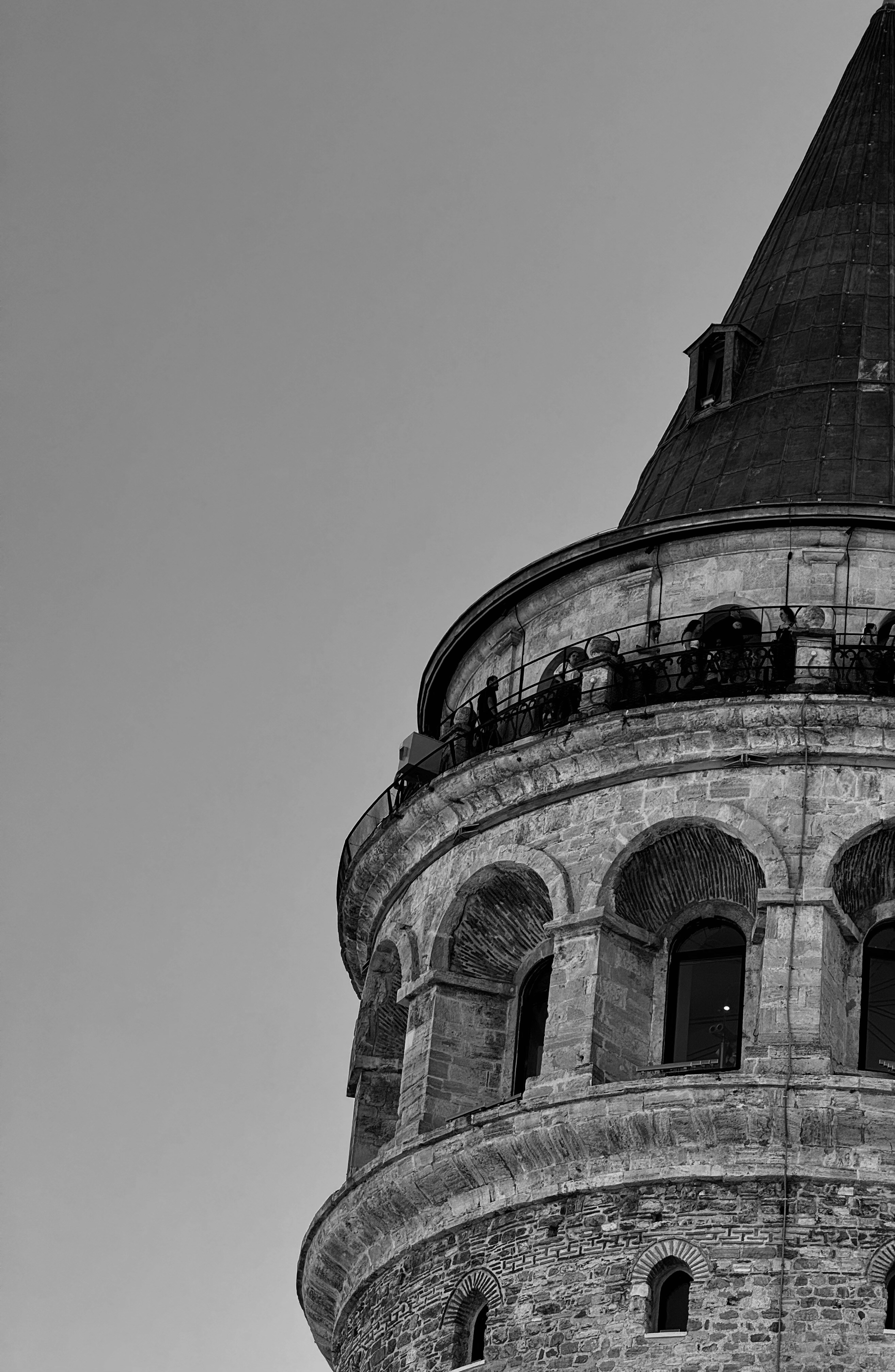 A black and white photo of a clock tower