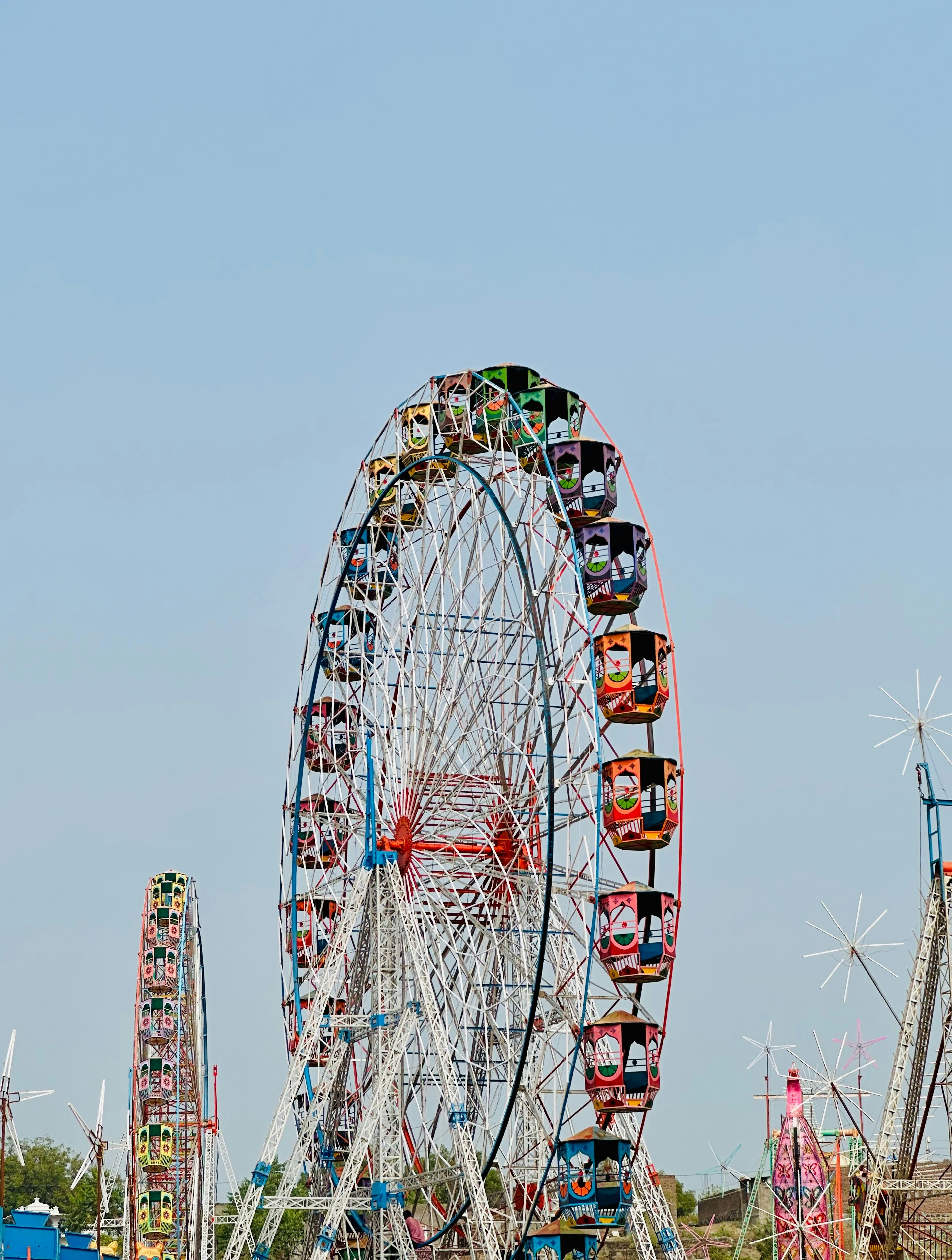 An amusement park with a ferris wheel and rides photo – Free Amusement ...