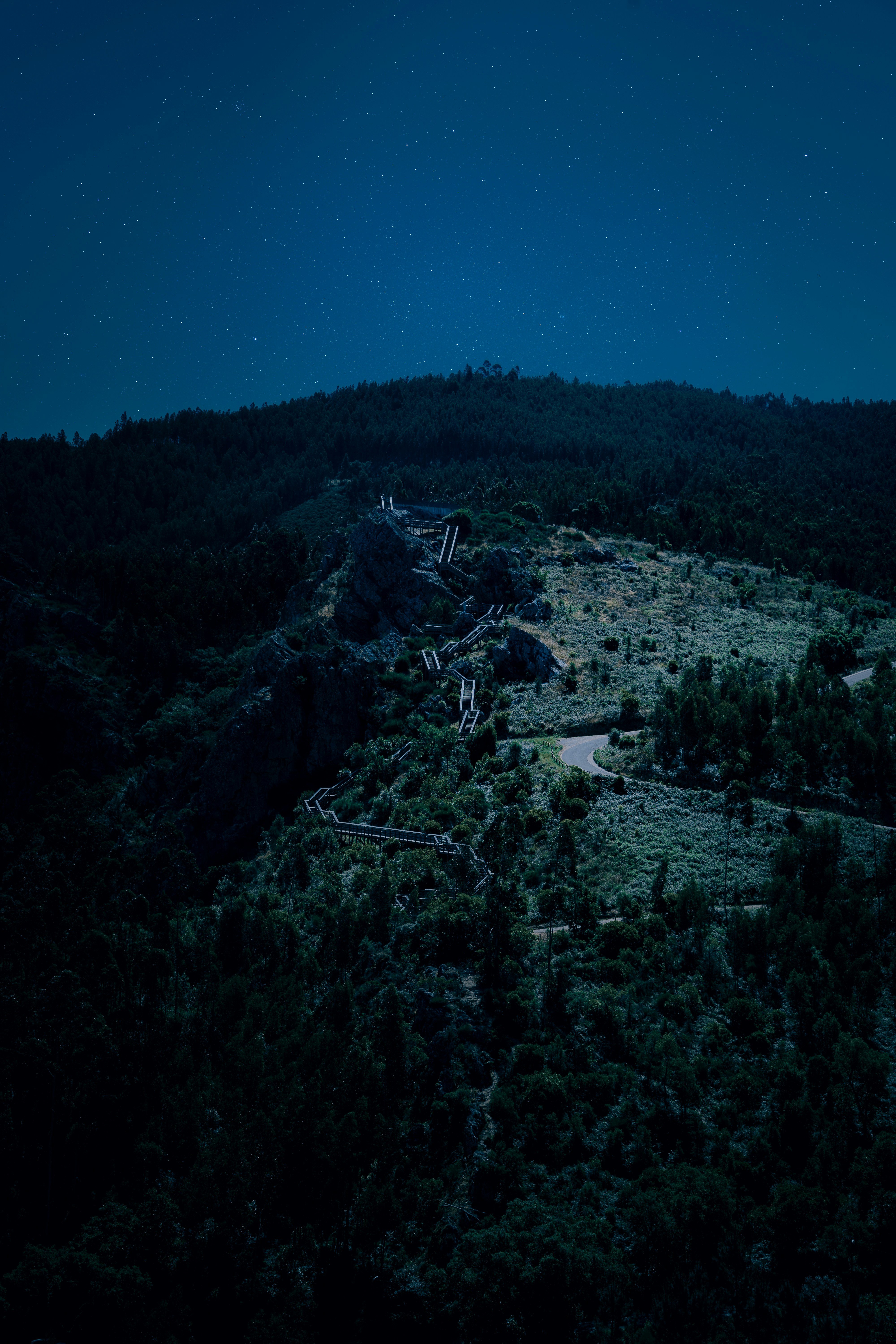 Starlit Ridge Walk: A Winding Staircase Beneath the Velvet Night