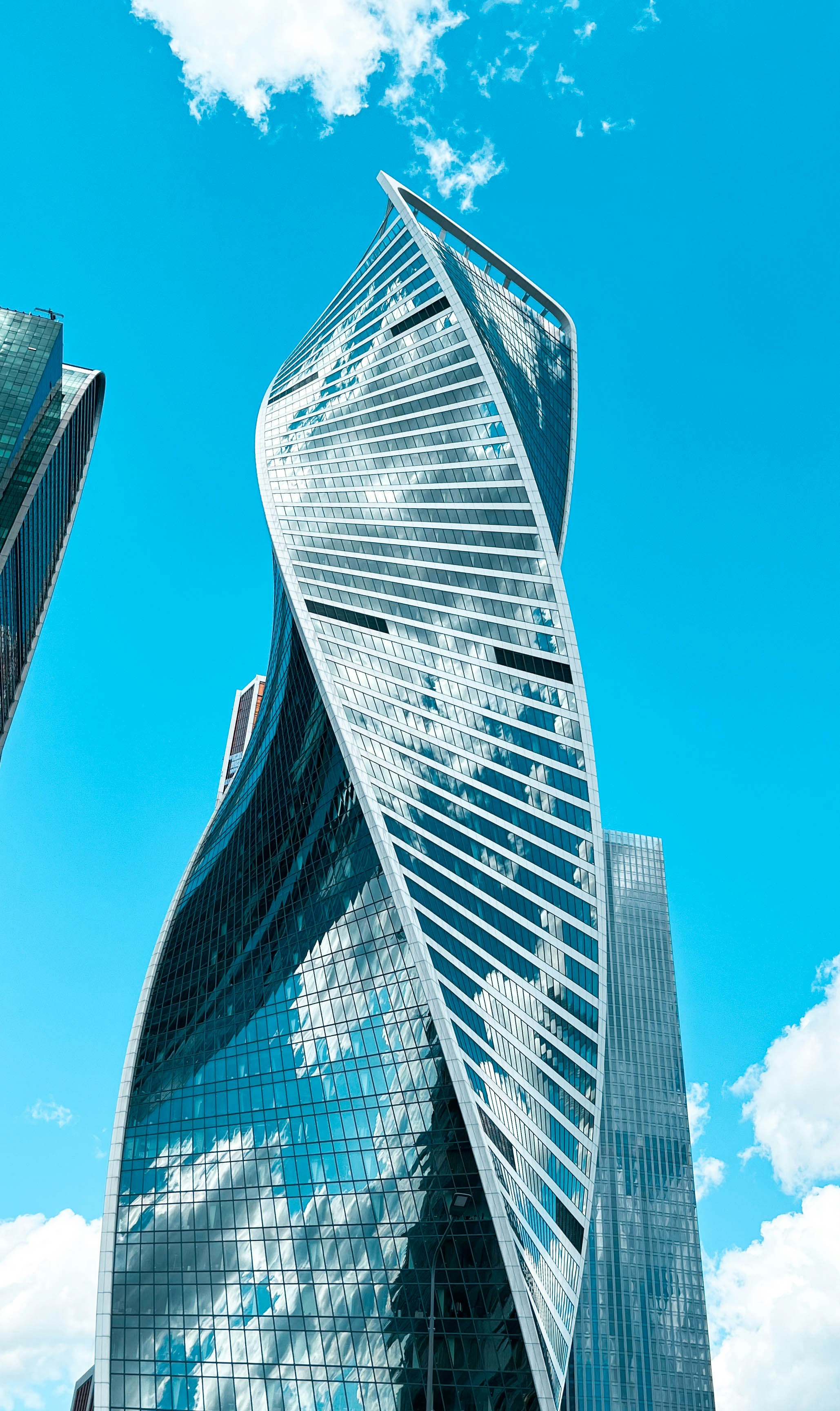Two very tall buildings with a sky background photo – Free Moscow Image ...