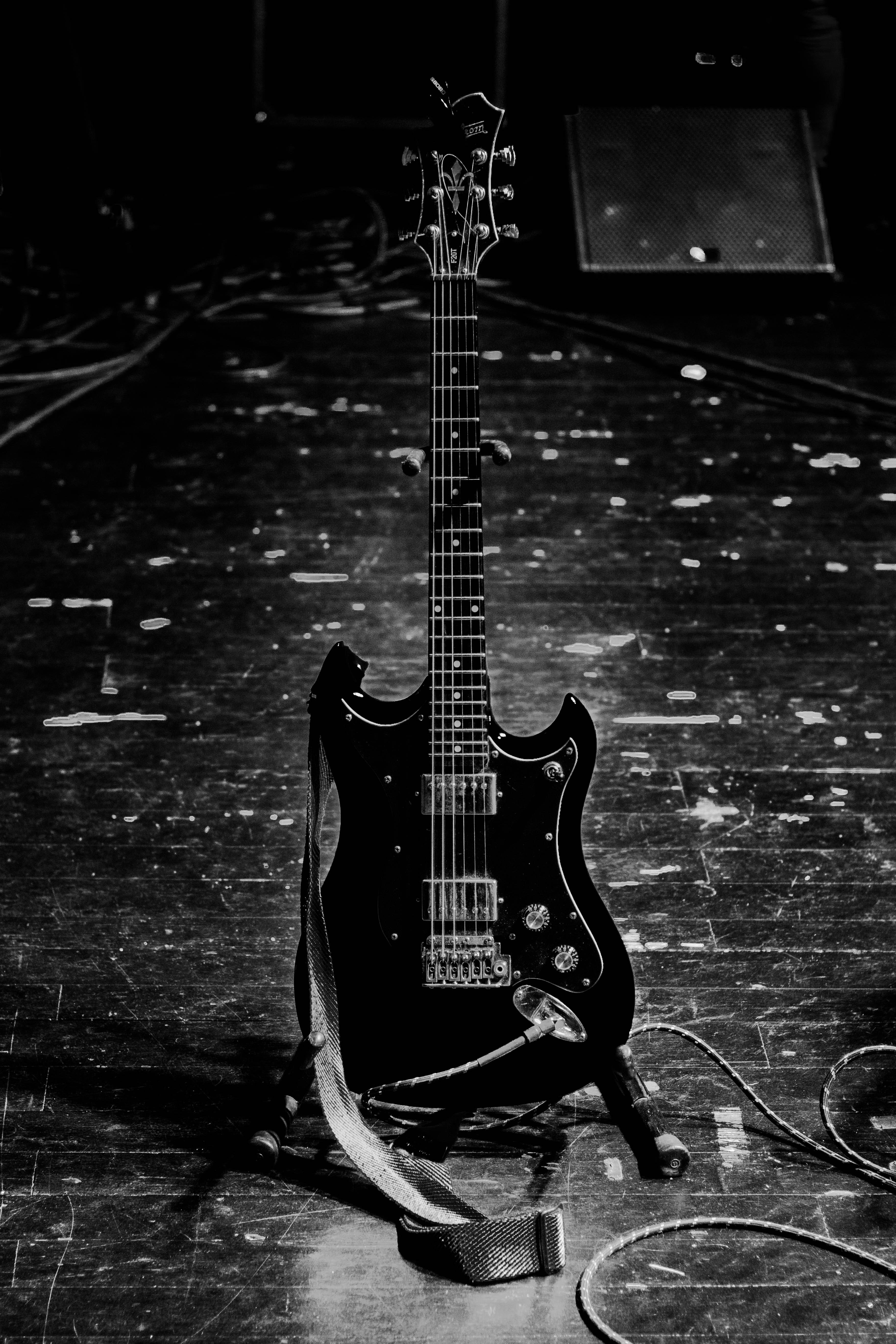 Midnight Strat on a Dimly Lit Stage