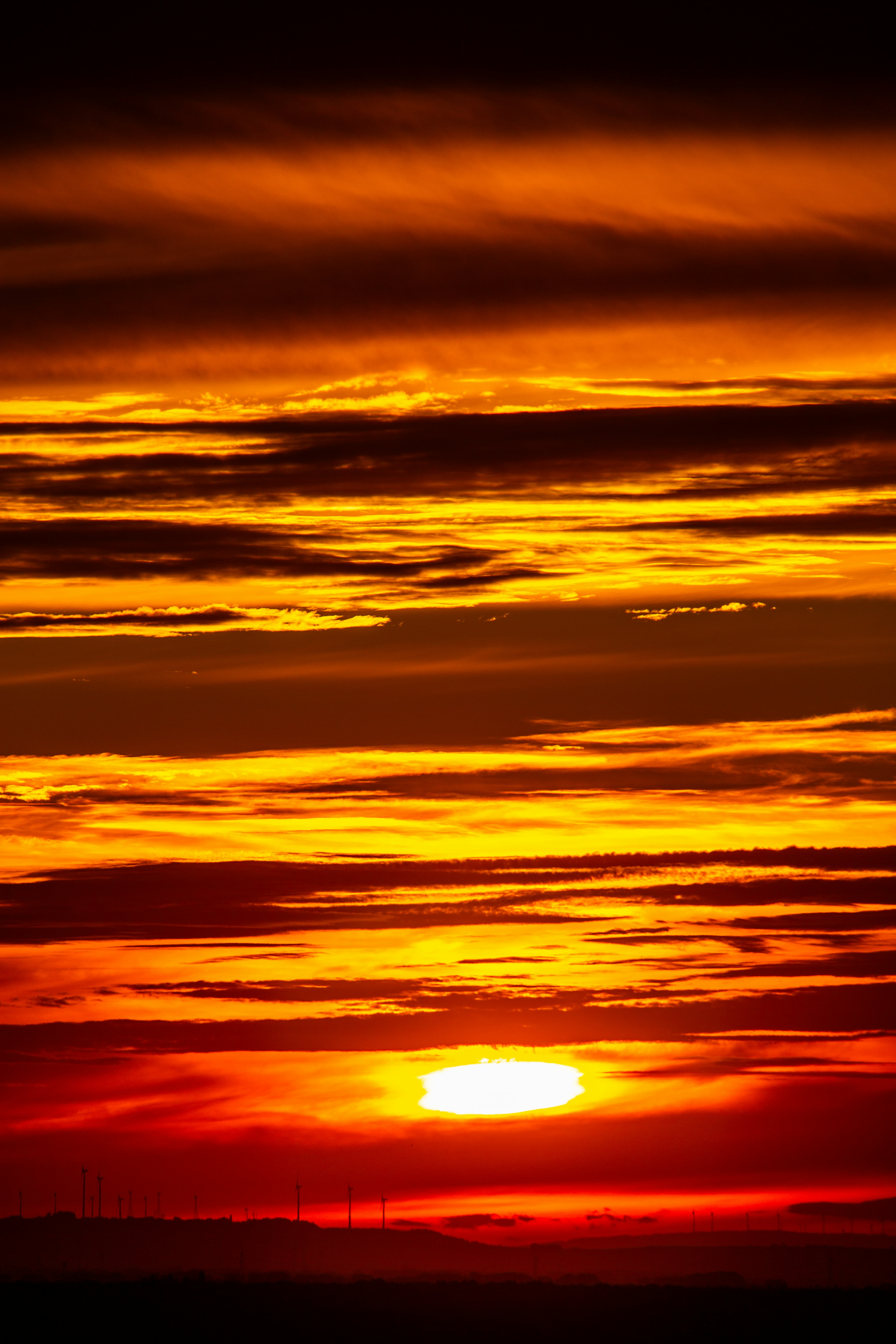 The sun is setting over the horizon of the sky photo – Free 69469 ...