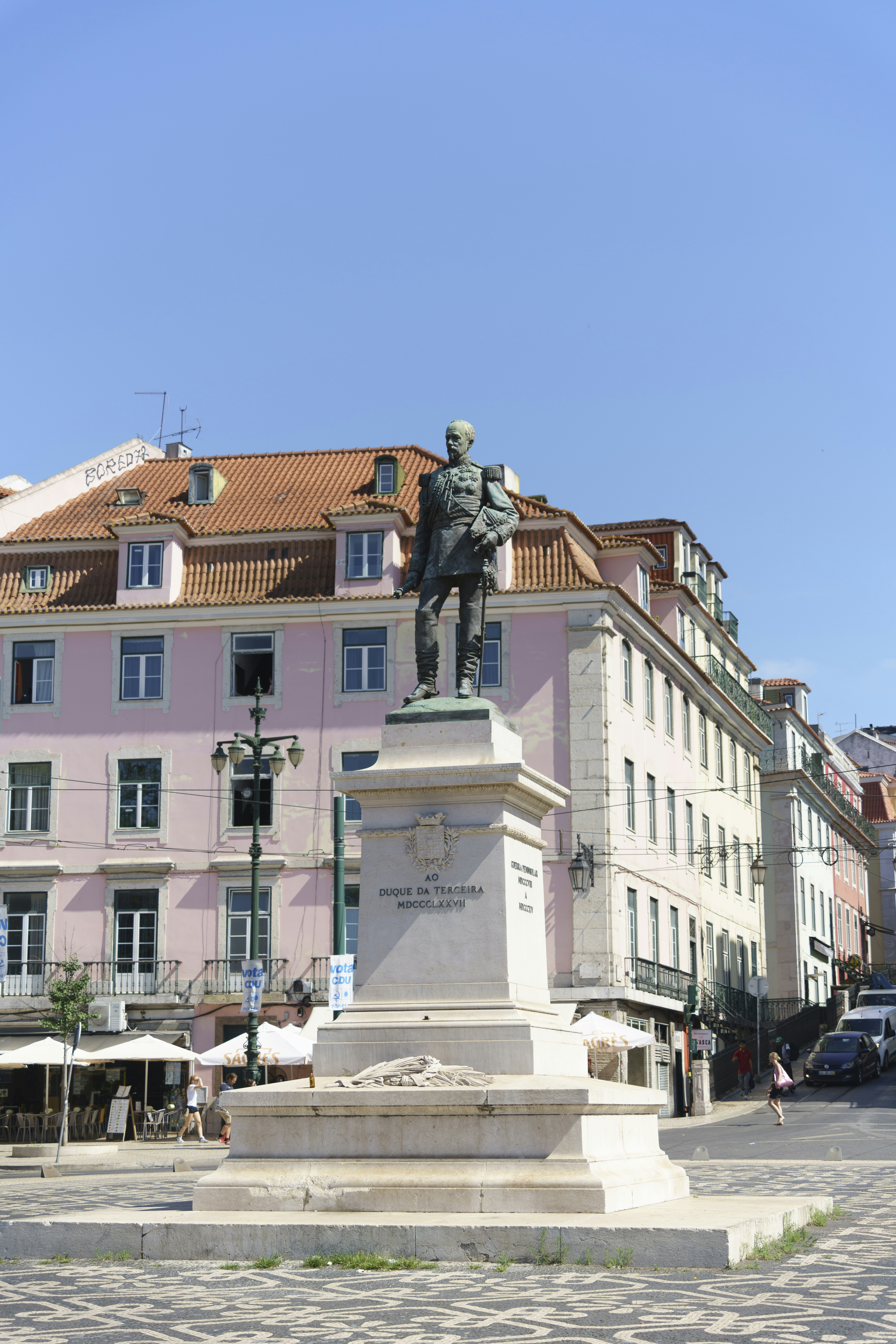 Stone Sentinel in a Sunlit European Square