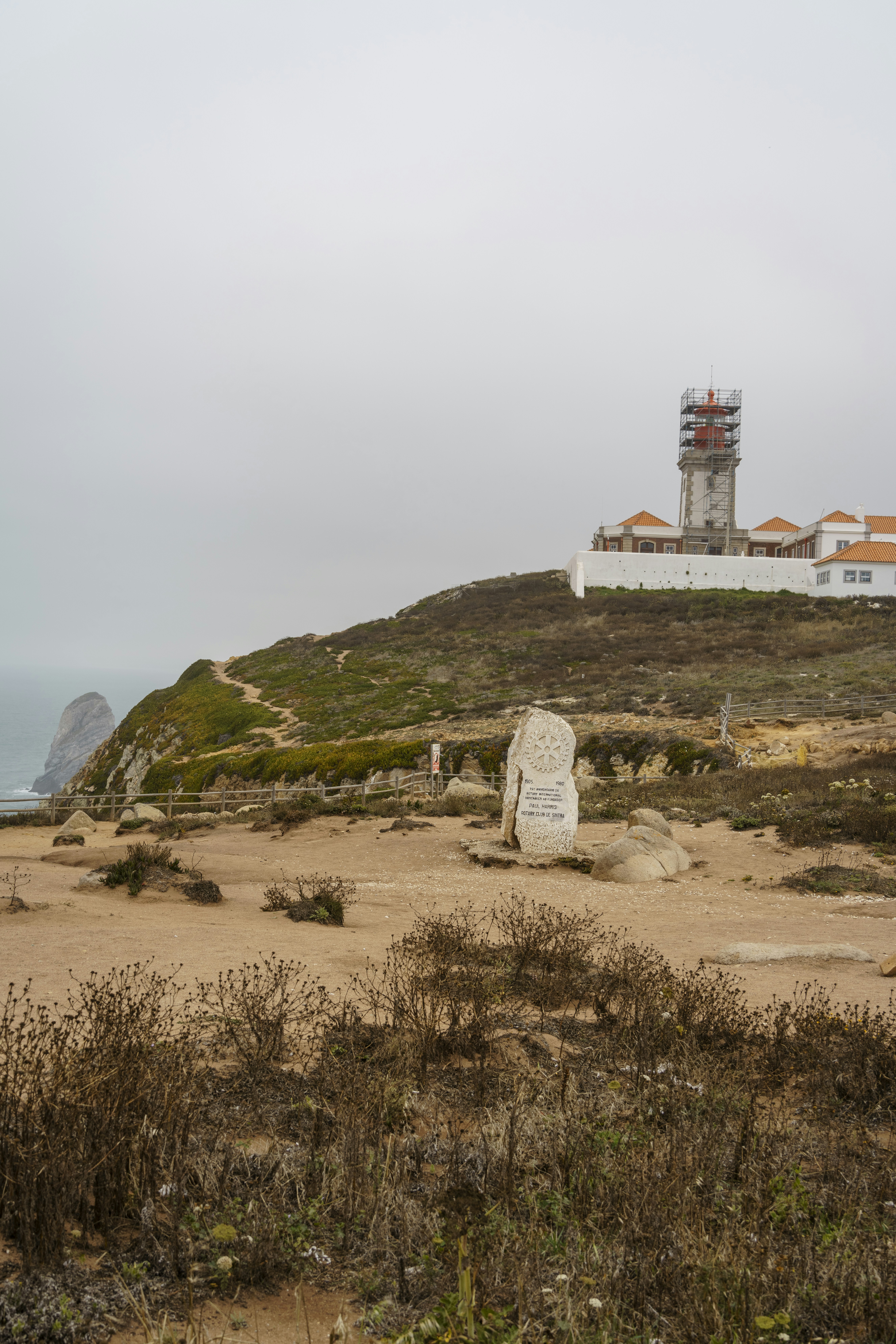 Cliffside Beacon: Windswept Path to a Hilltop Lighthouse