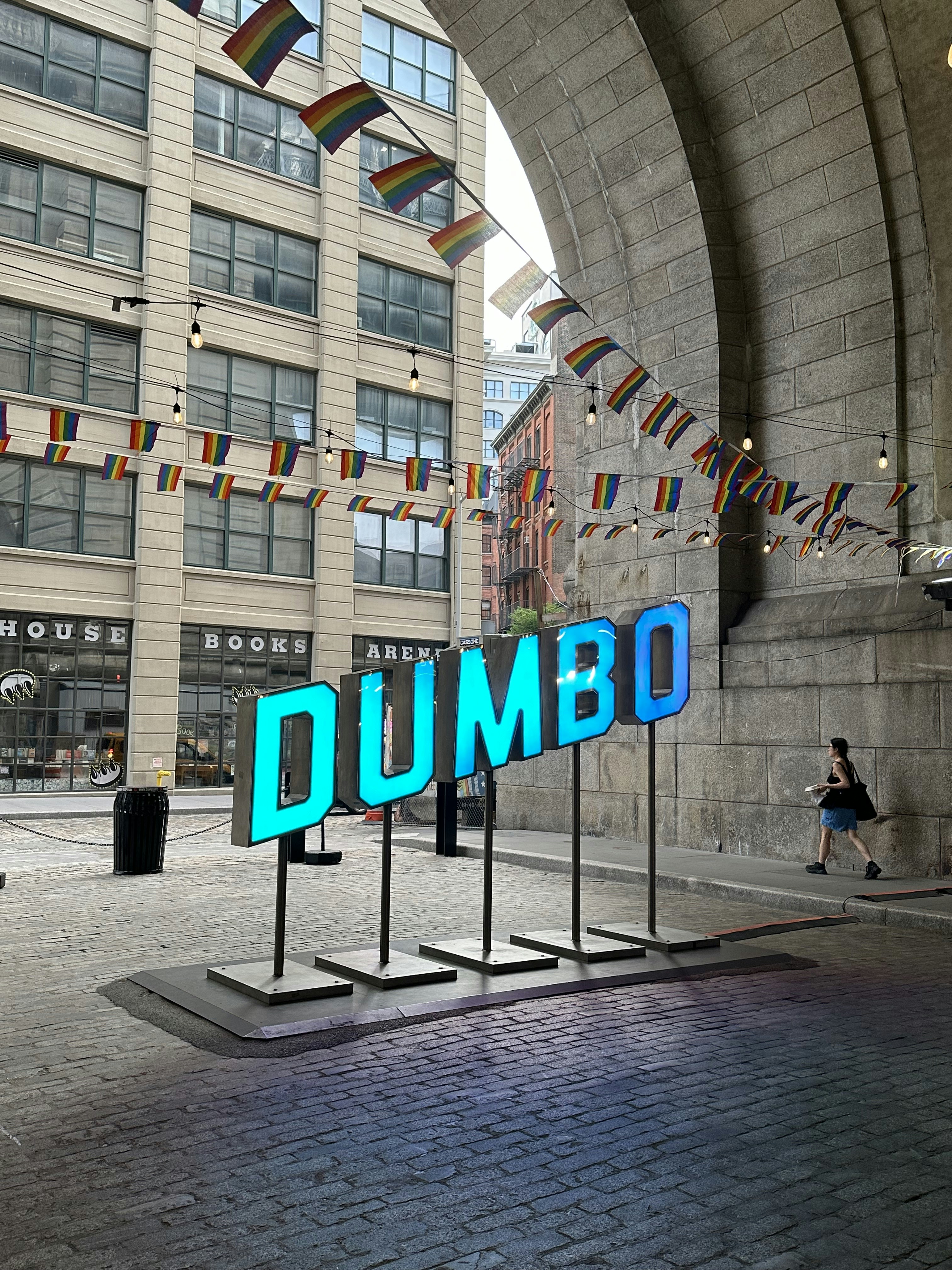 Blue DUMBO Letters Under a Rainbow Canopy