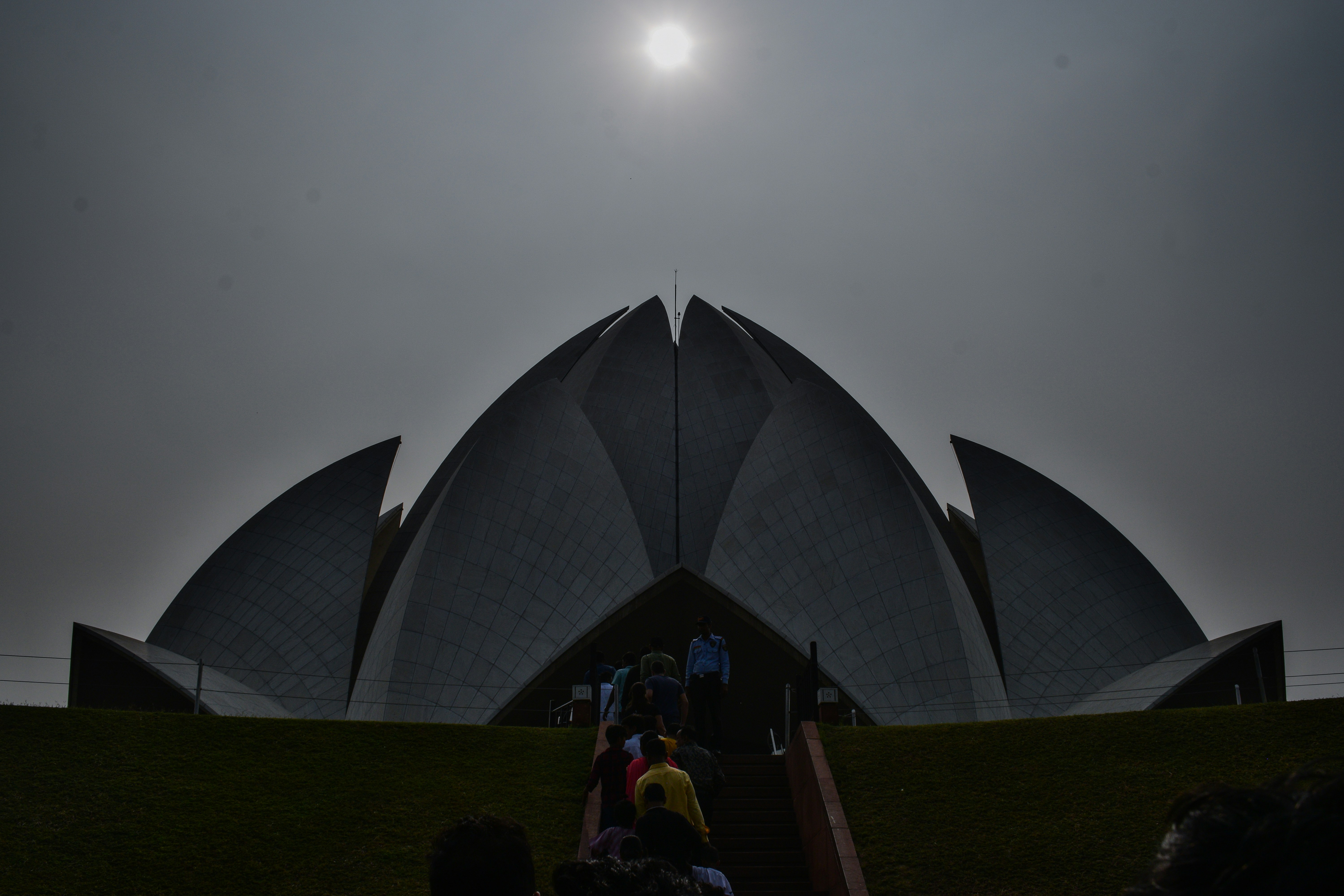 Steps Toward the Sails: Silhouettes Ascend to Sydney Opera House