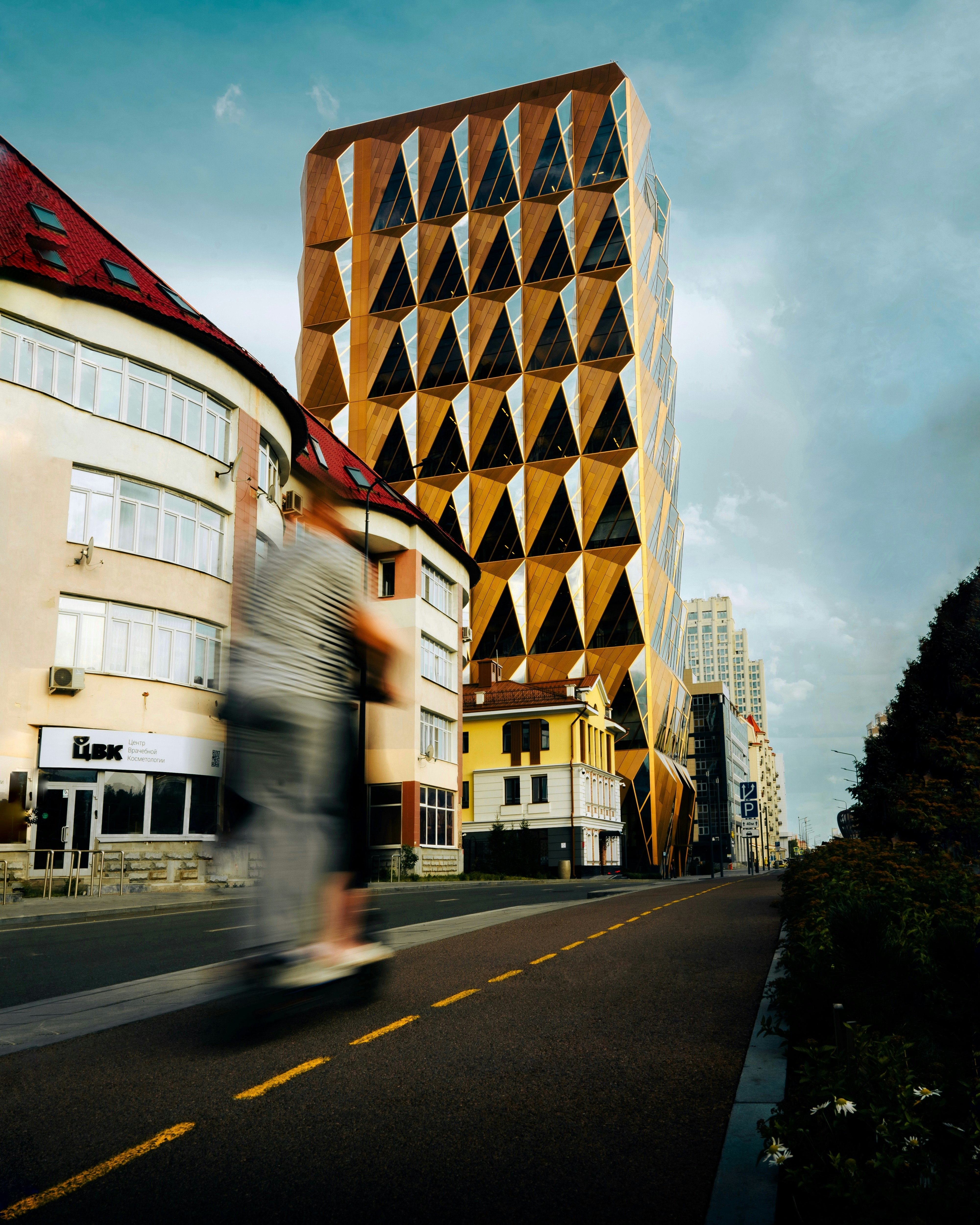 The Golden Facade Looms Over a Quiet City Street