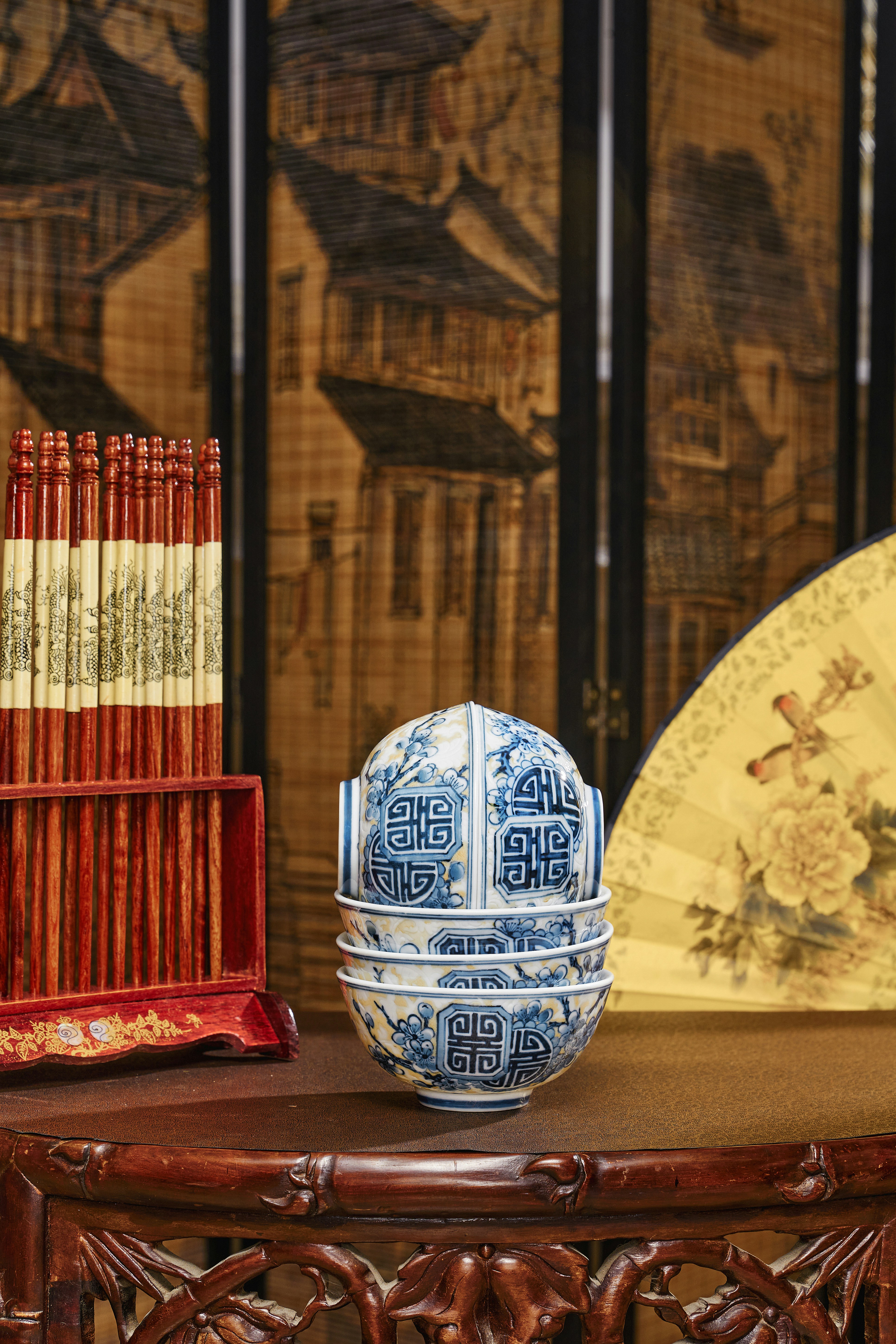 Blue-and-White Ceramic Nest: A Stacked Egg motif on a lacquered Chinese Table