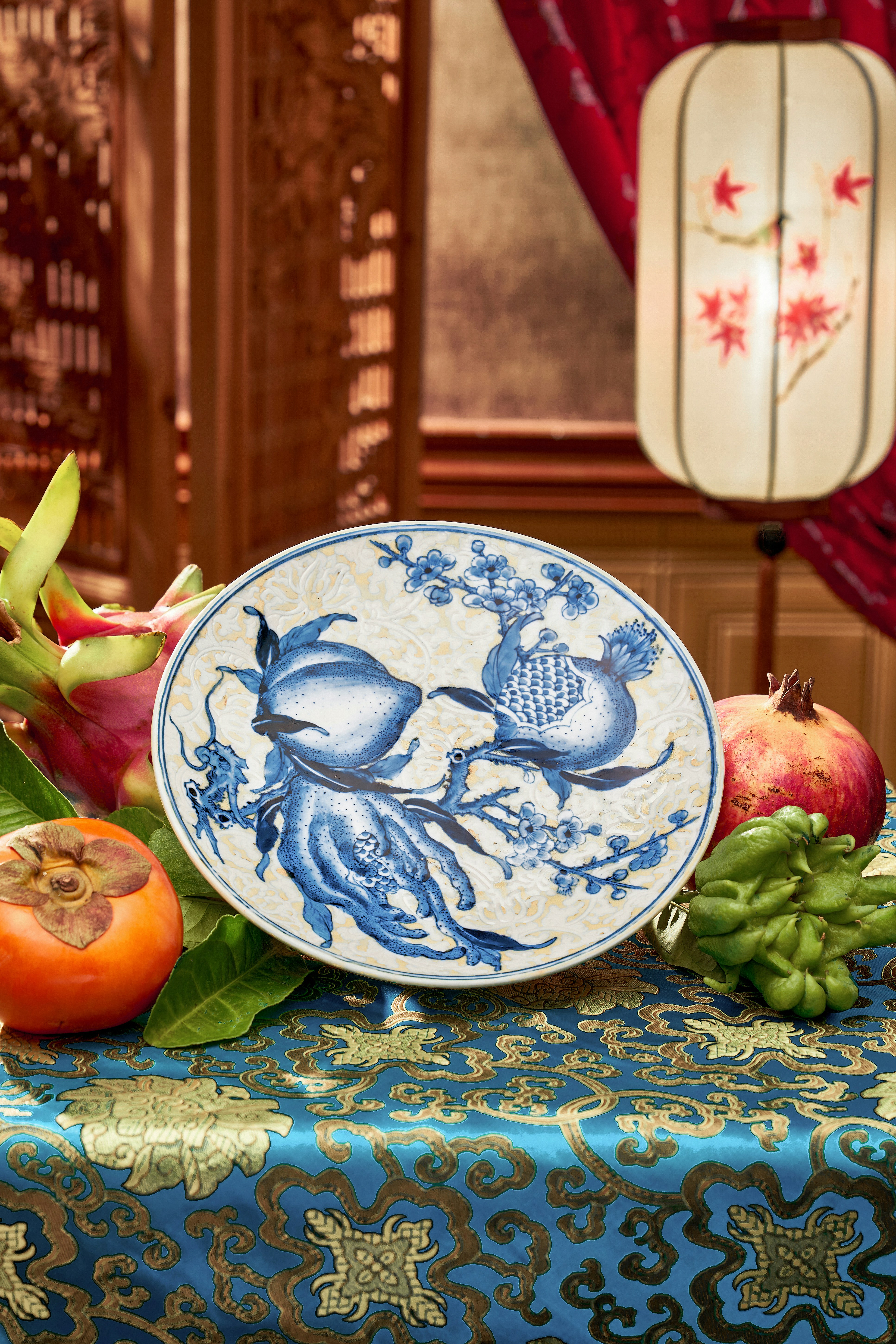 Blue Cranes on a Ceramic Plate: A Still Life of Oriental Splendor
