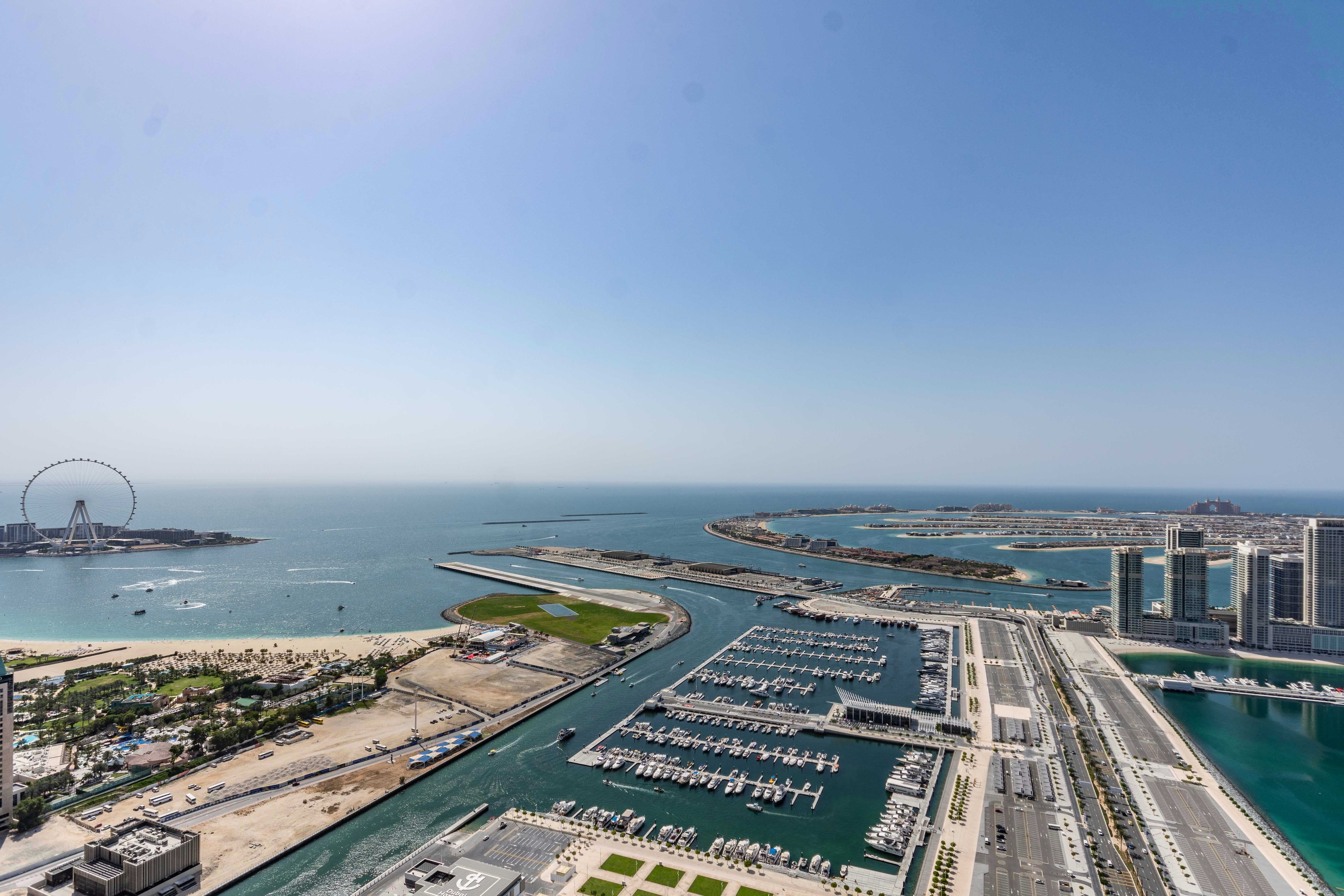 An aerial view of a city and a harbor photo – Free Dubai - united arab ...