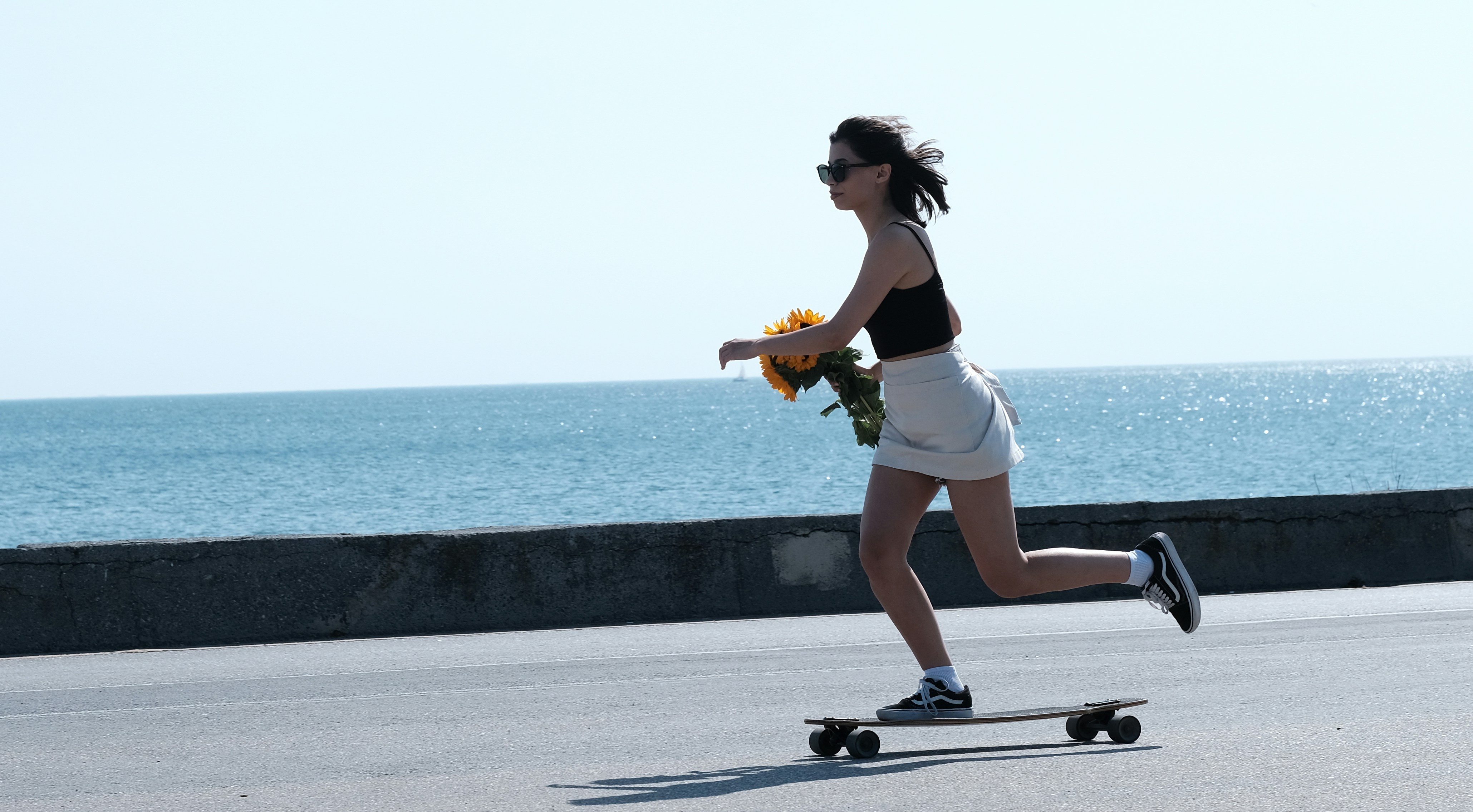 Bouquet on Board: a sunlit skate along the sea wall