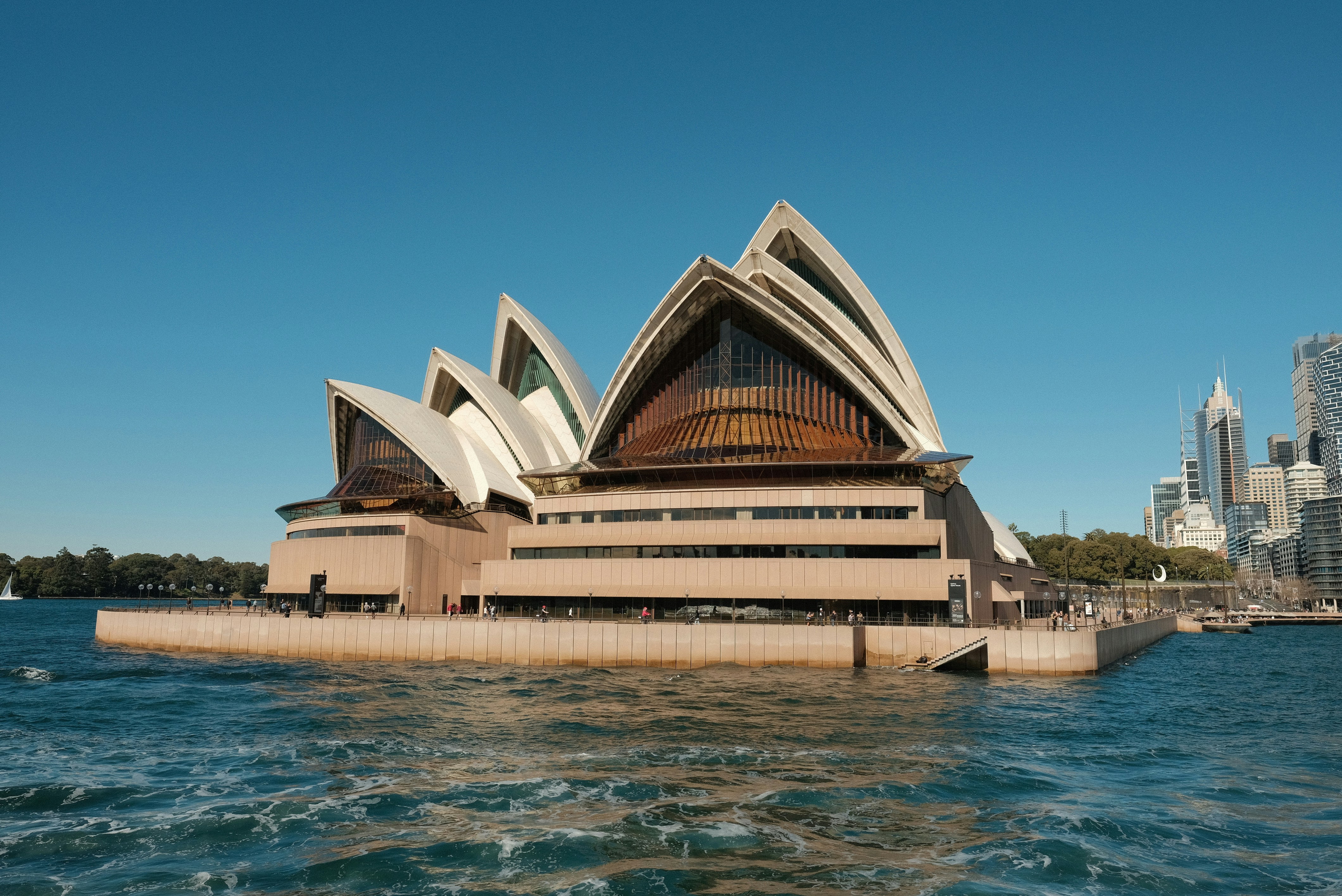 A view of the sydney opera house from across the water photo – Free ...