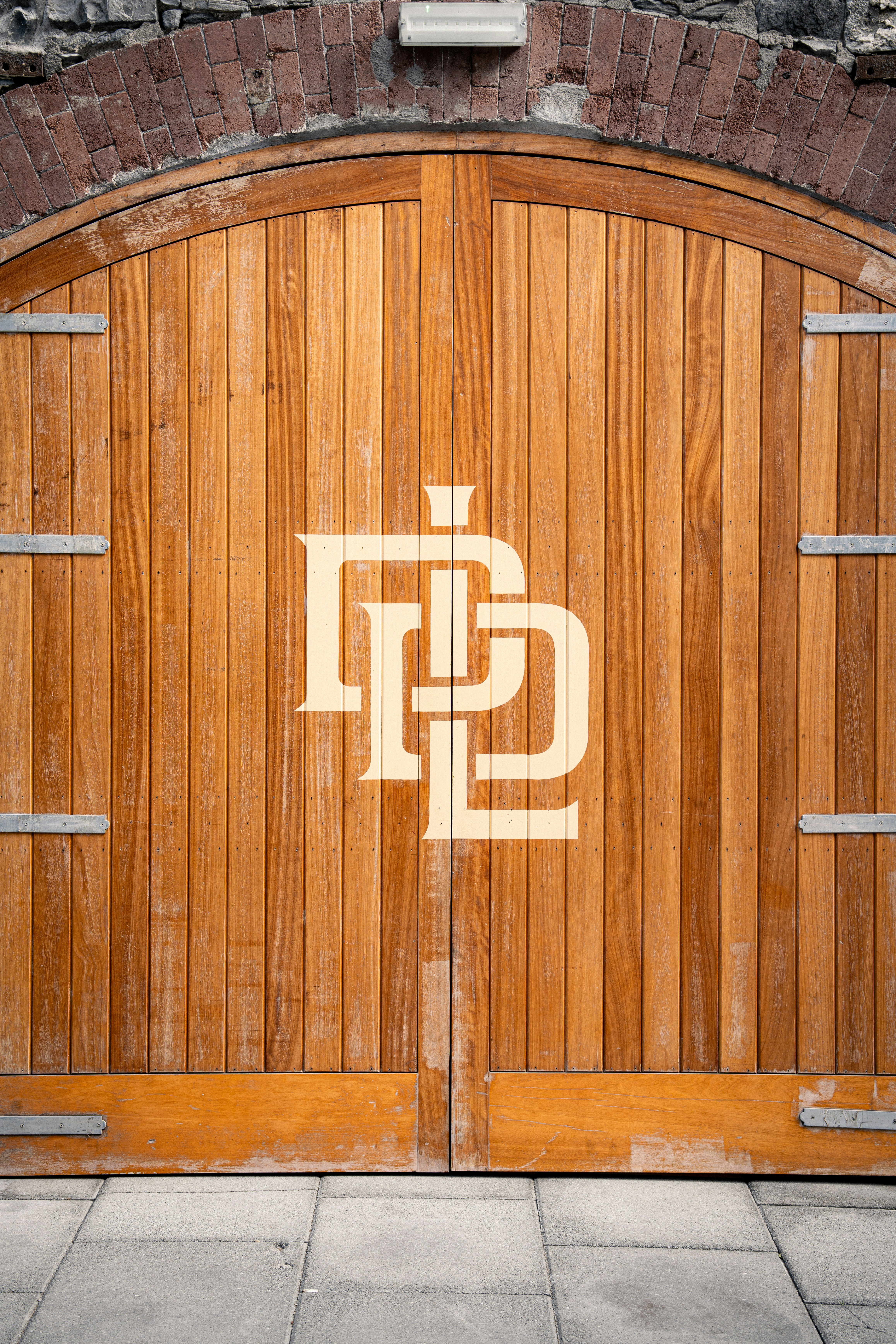Interlocking LD Monogram on a Warm Wooden Door