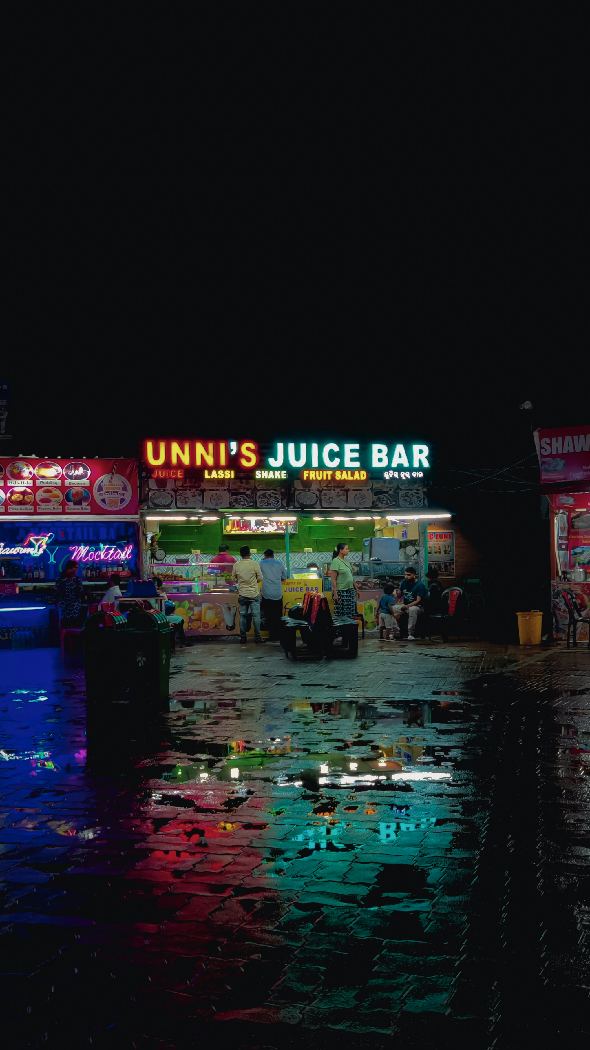 A neon juice bar on a rainy night photo – Free Bhubaneswar Image on ...