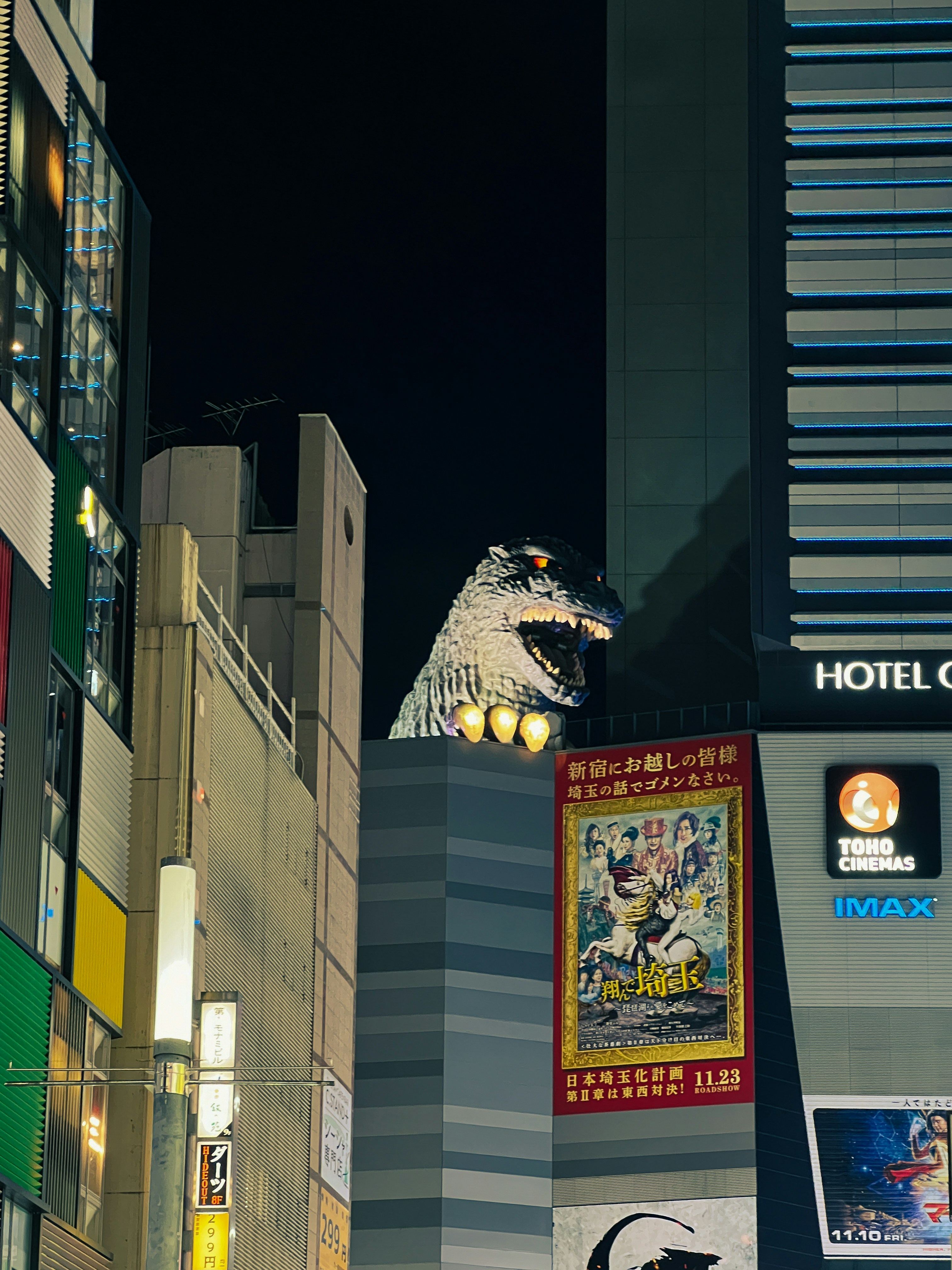 Neon Kaiju Above the City: Night at Toho’s Neon Crossroads
