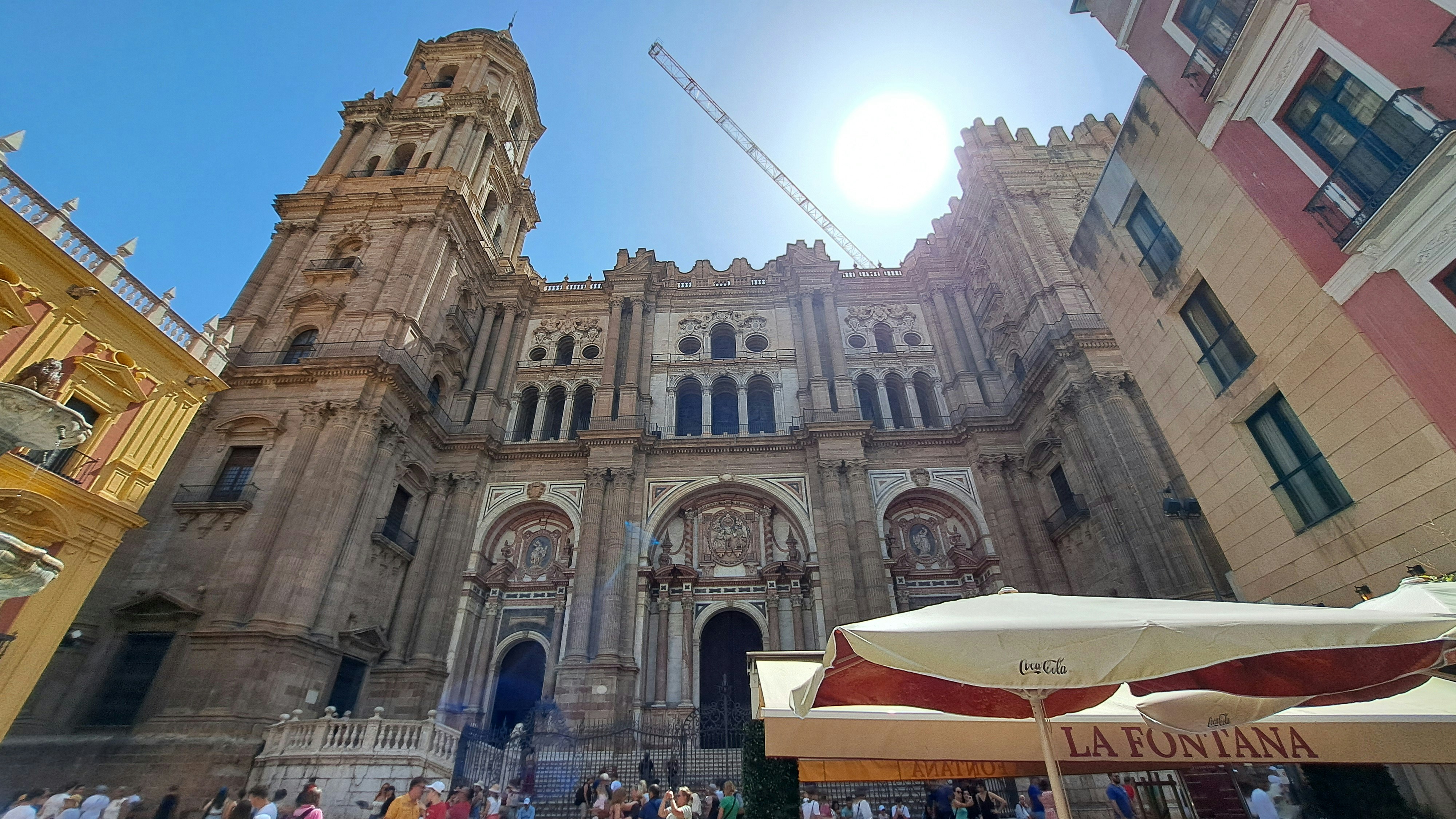 Facade of the Grand Cathedral: A Sunlit Stone Portrait