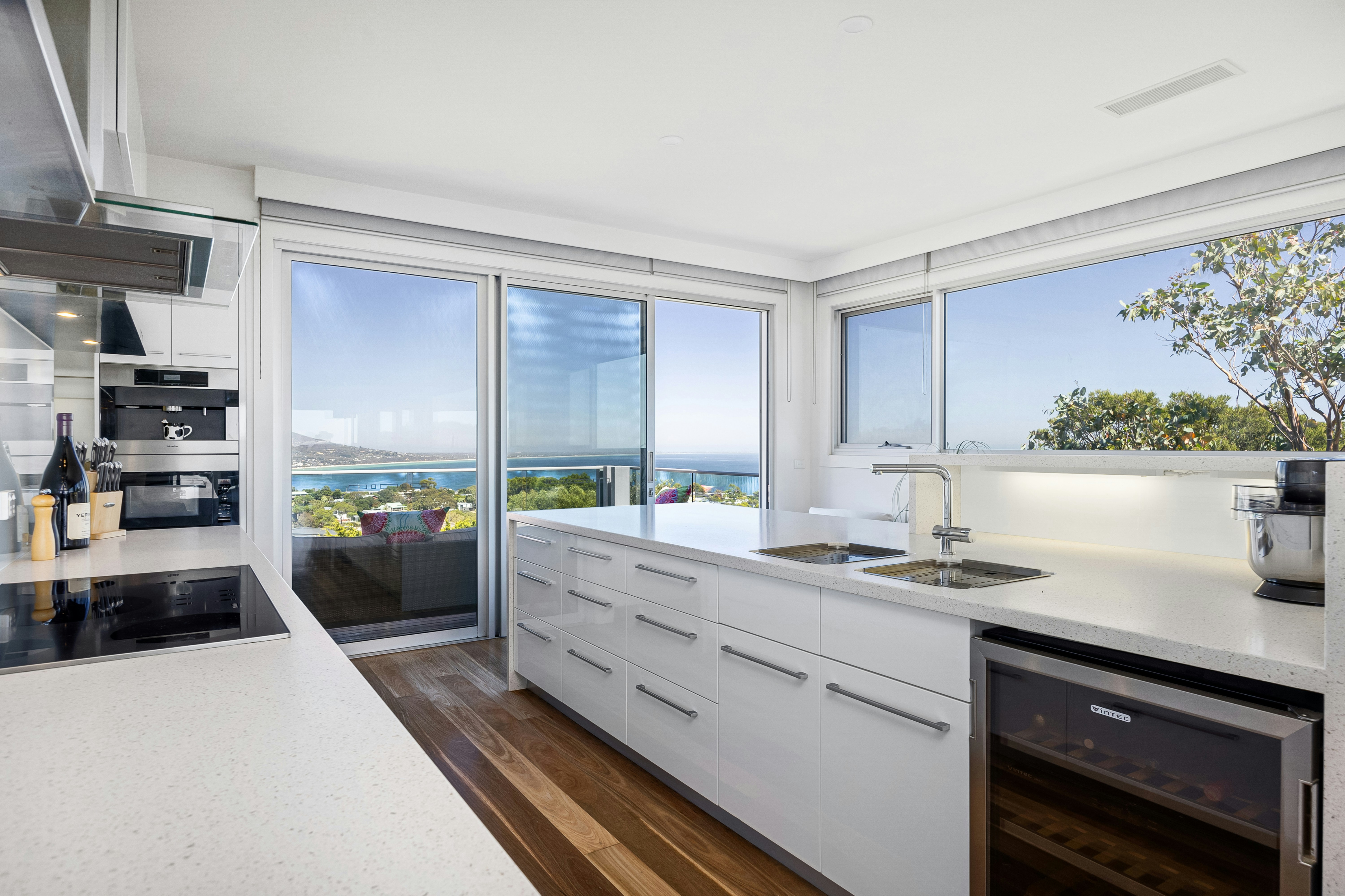 A kitchen with a stove top oven next to a window photo – Free Interior ...