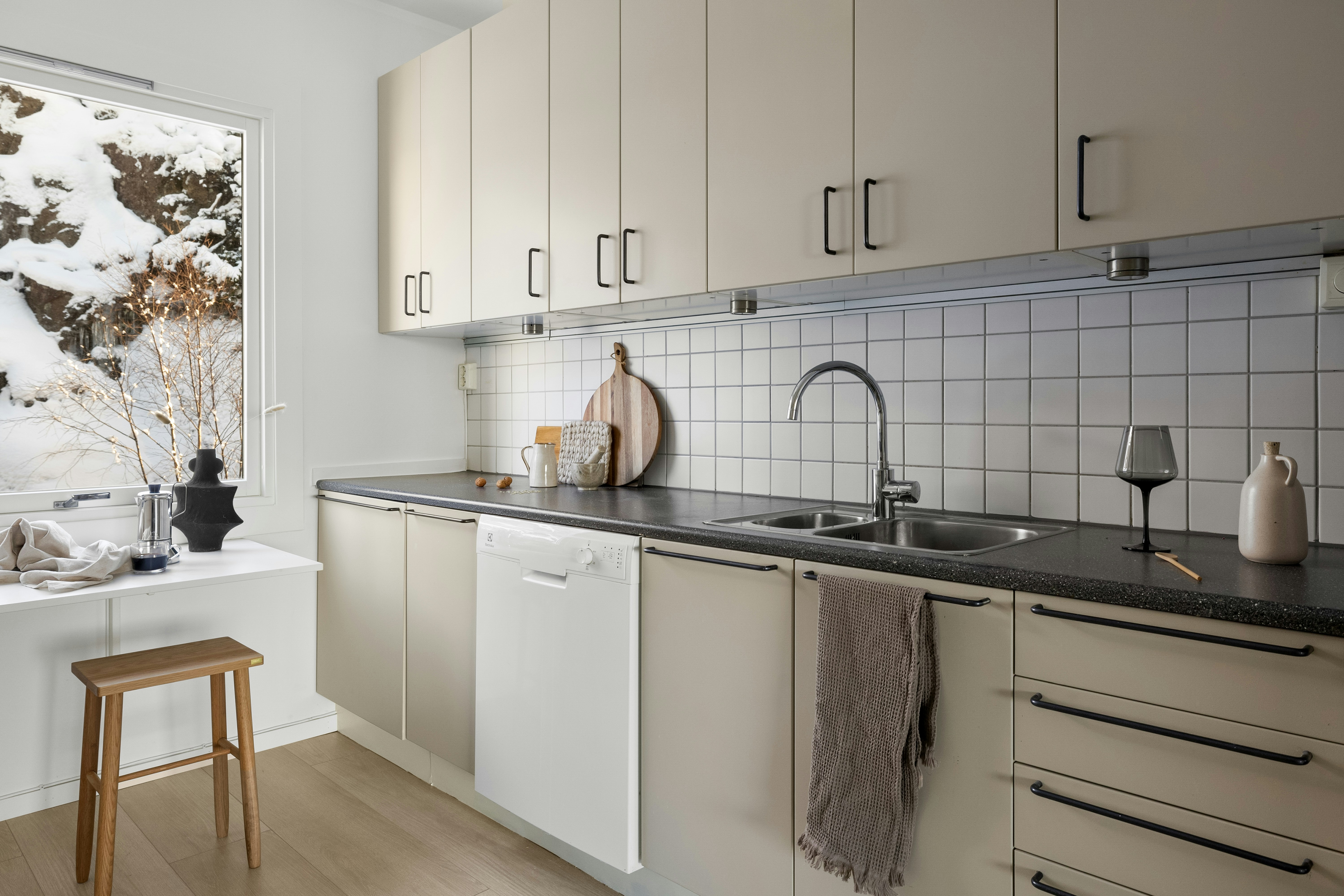 A kitchen with a sink, dishwasher and a window photo – Free Indoors ...