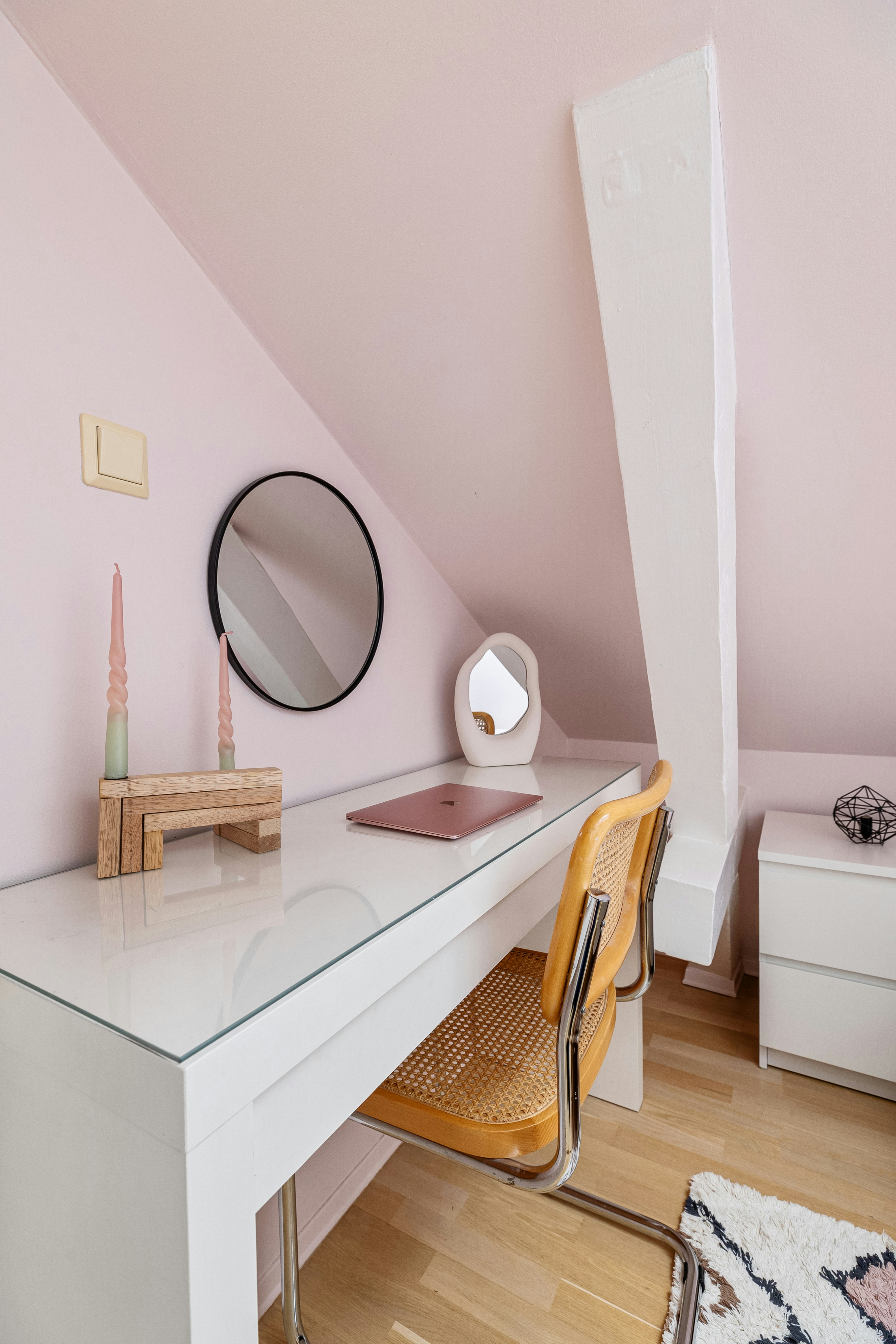 Pastel Nook: A Sloped-Ceiling Vanity with a Circular Mirror