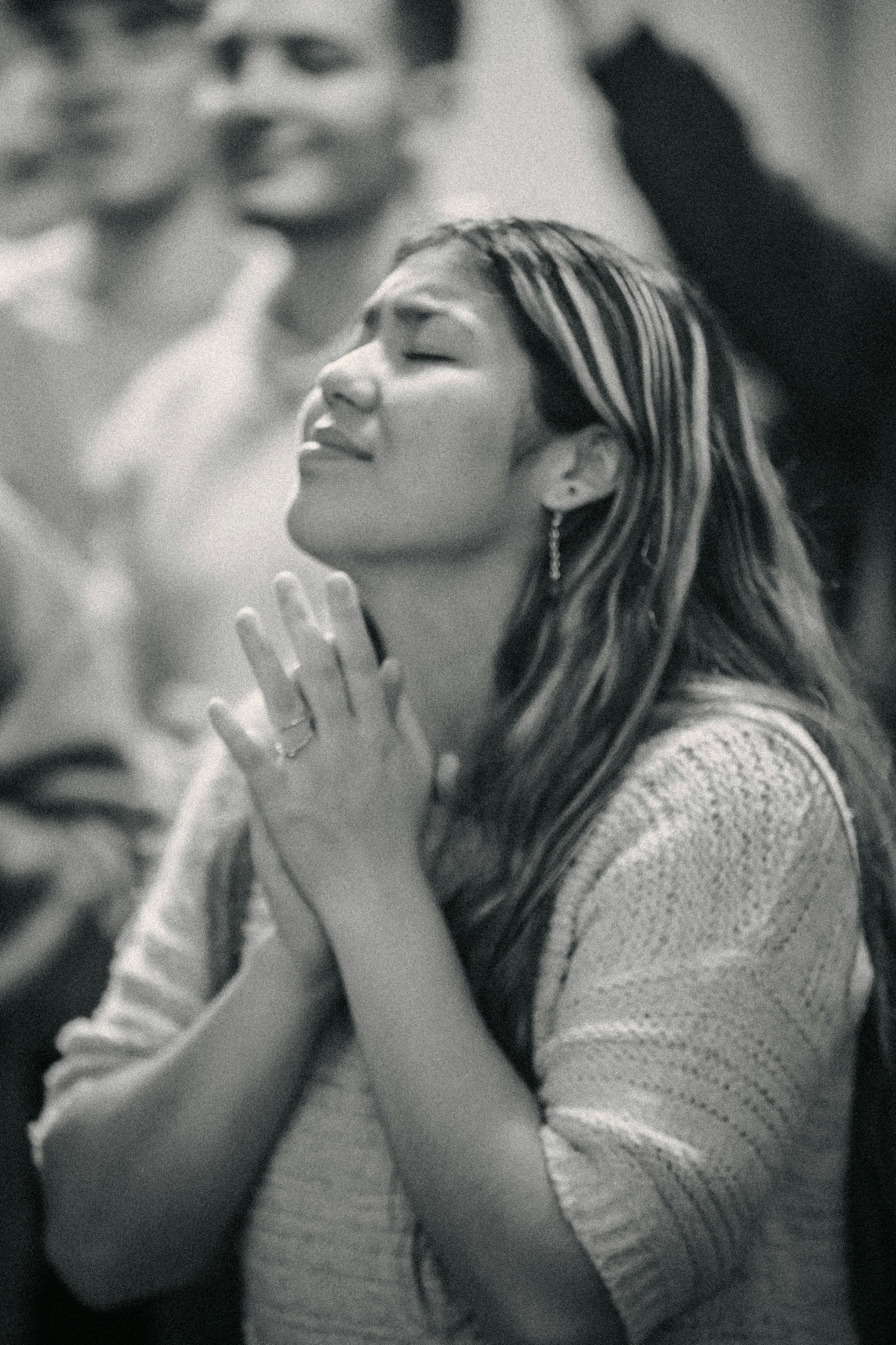 Whispered Prayers Amid the Crowd