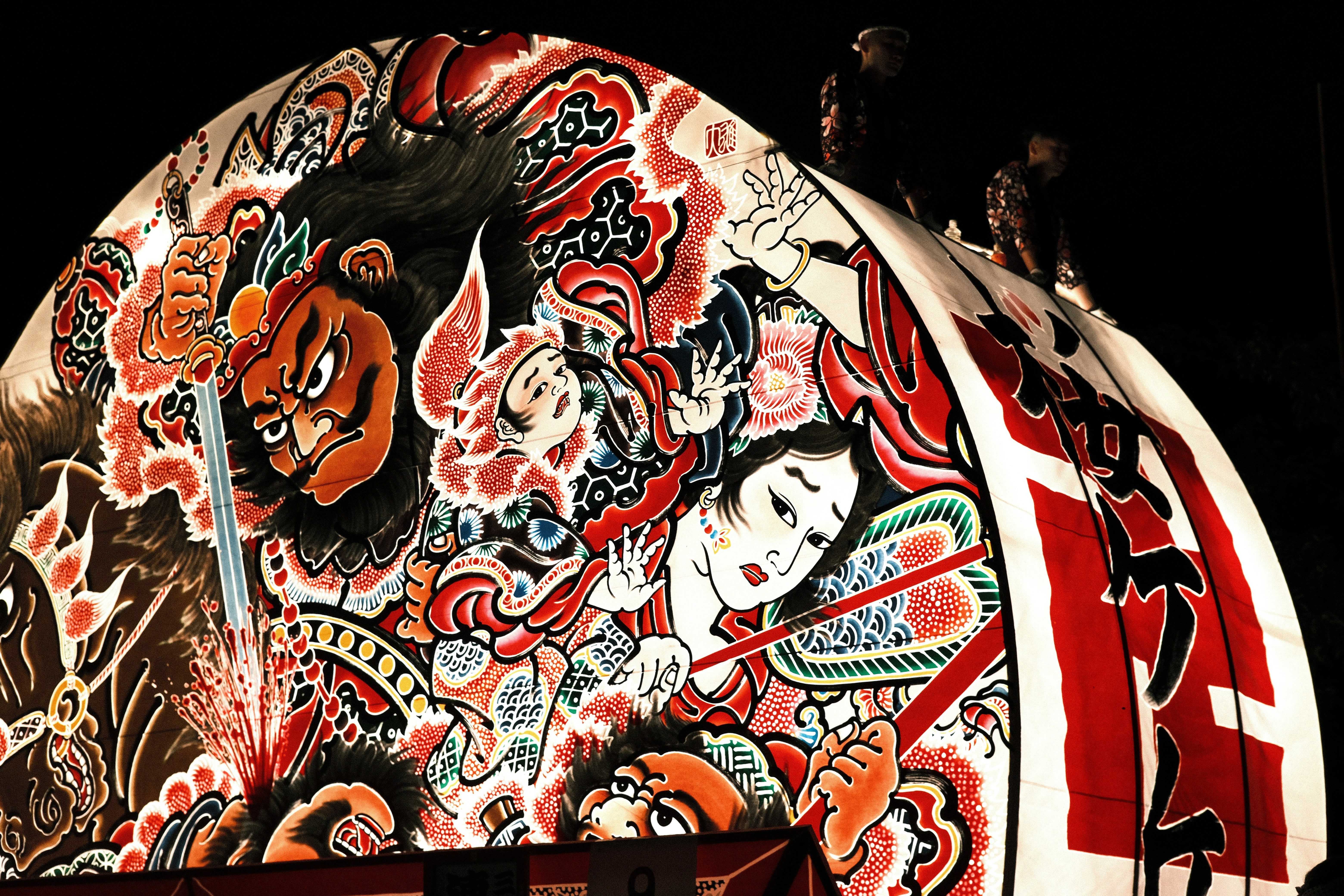 Oni and Geisha on a Luminous Nebuta Lantern at Night
