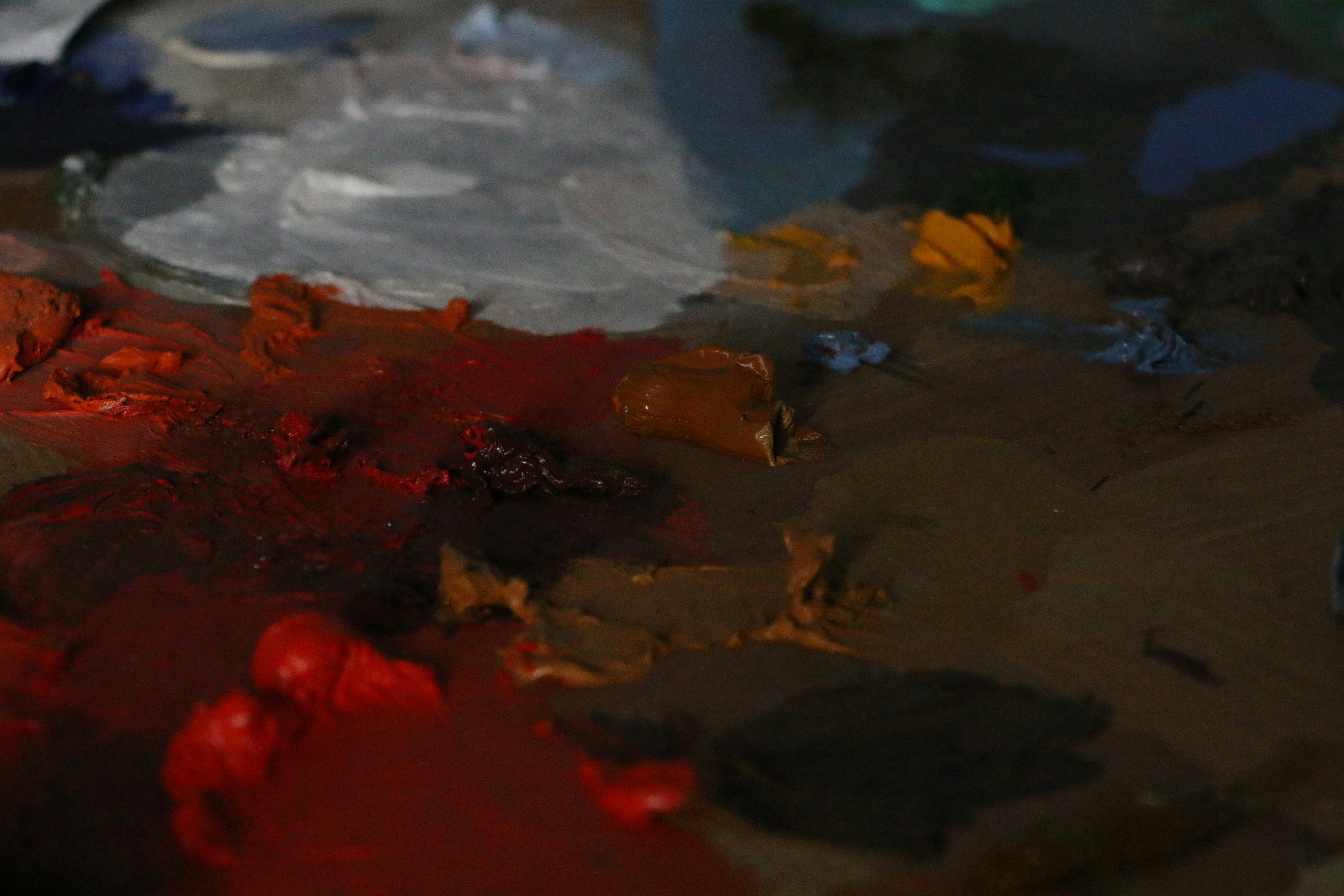Crimson Puddle on a Painter's Palette