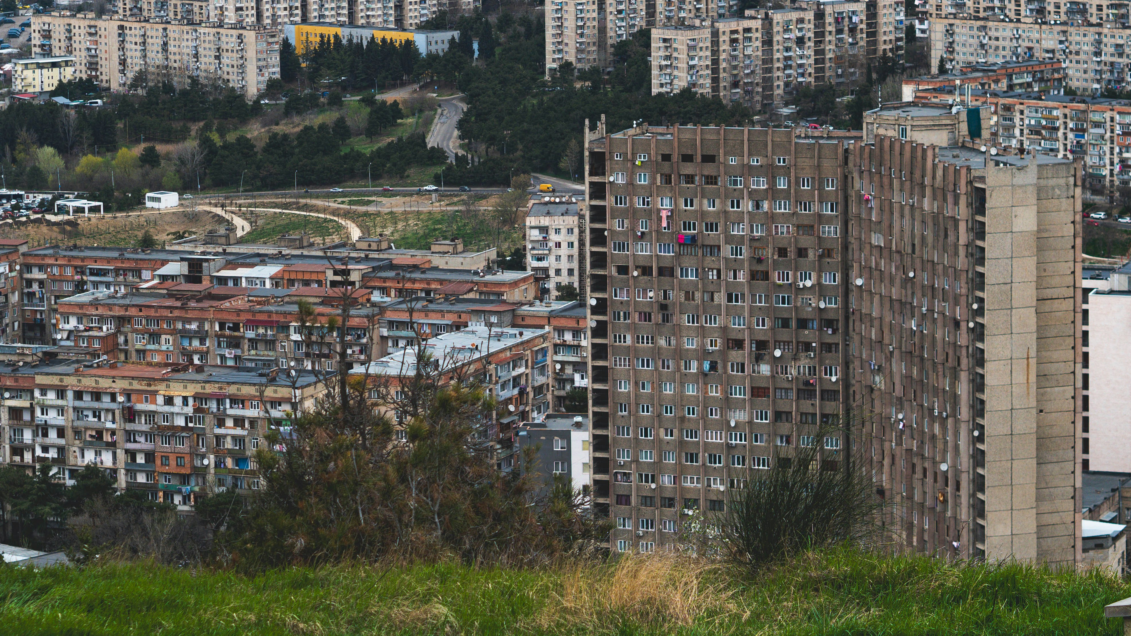 Terraced Heights: A hillside mosaic of weathered apartments