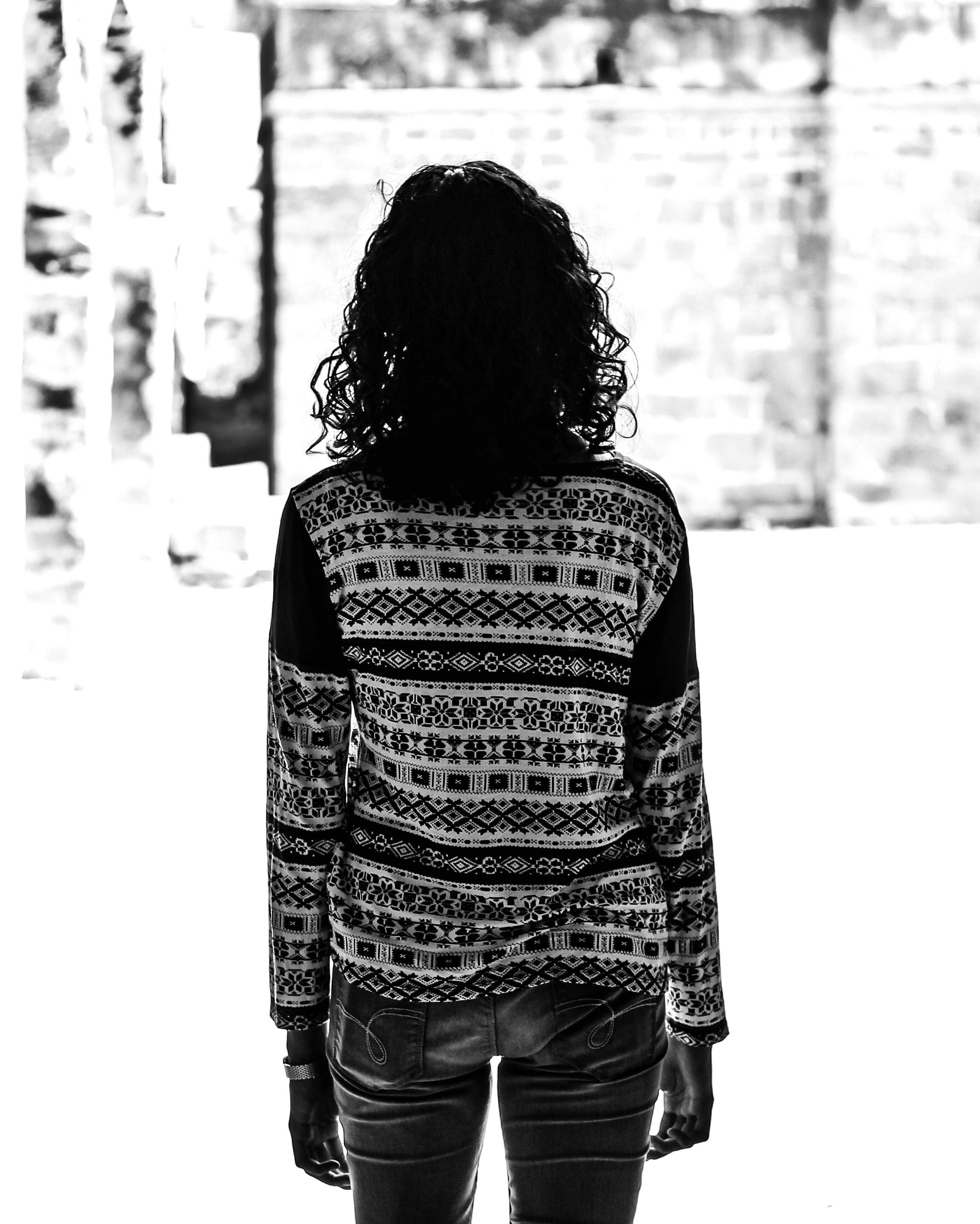 Back-View Portrait in High-Contrast Light: The Geometric Knit