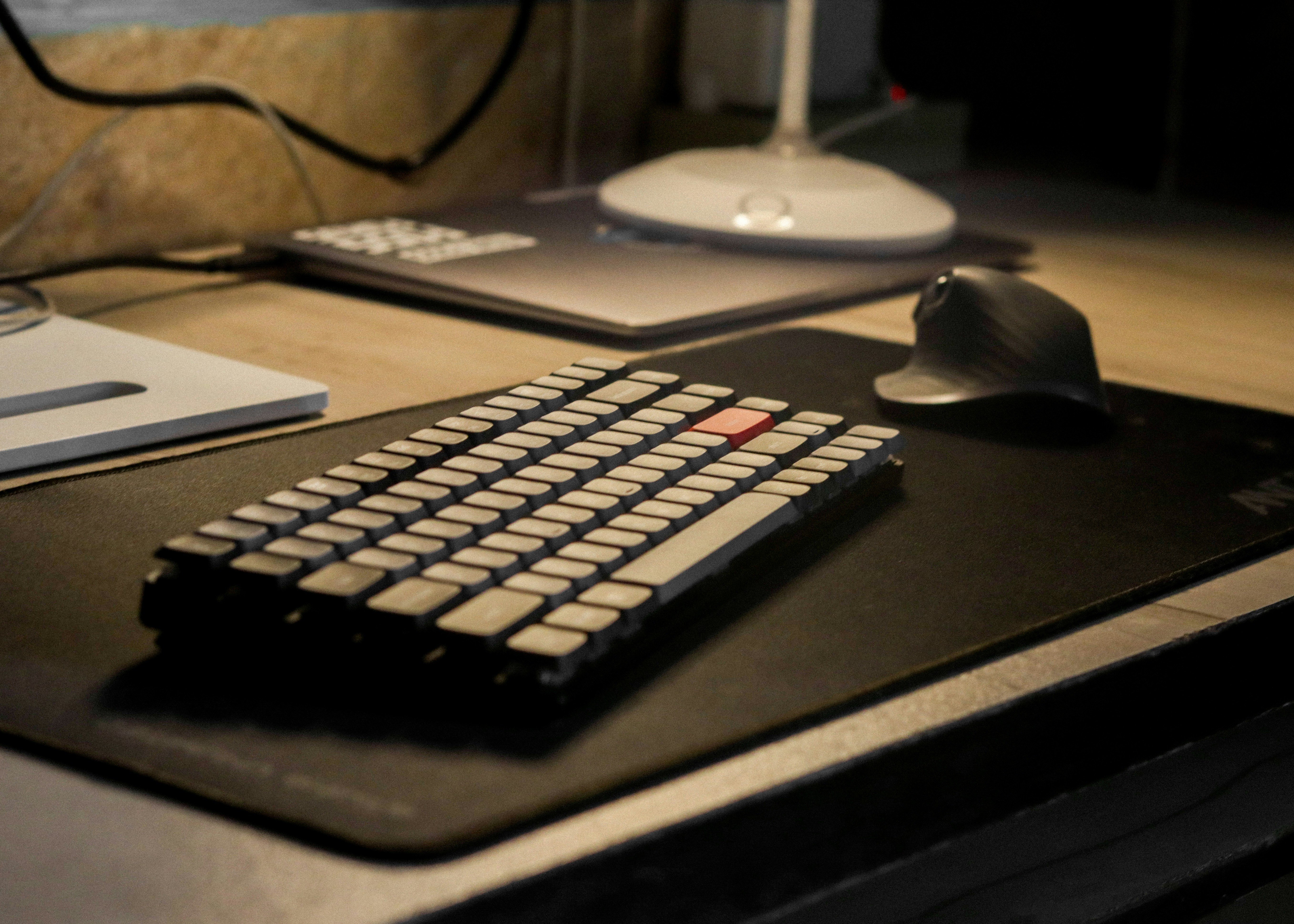 A computer keyboard and mouse on a desk photo – Free Mechanical ...