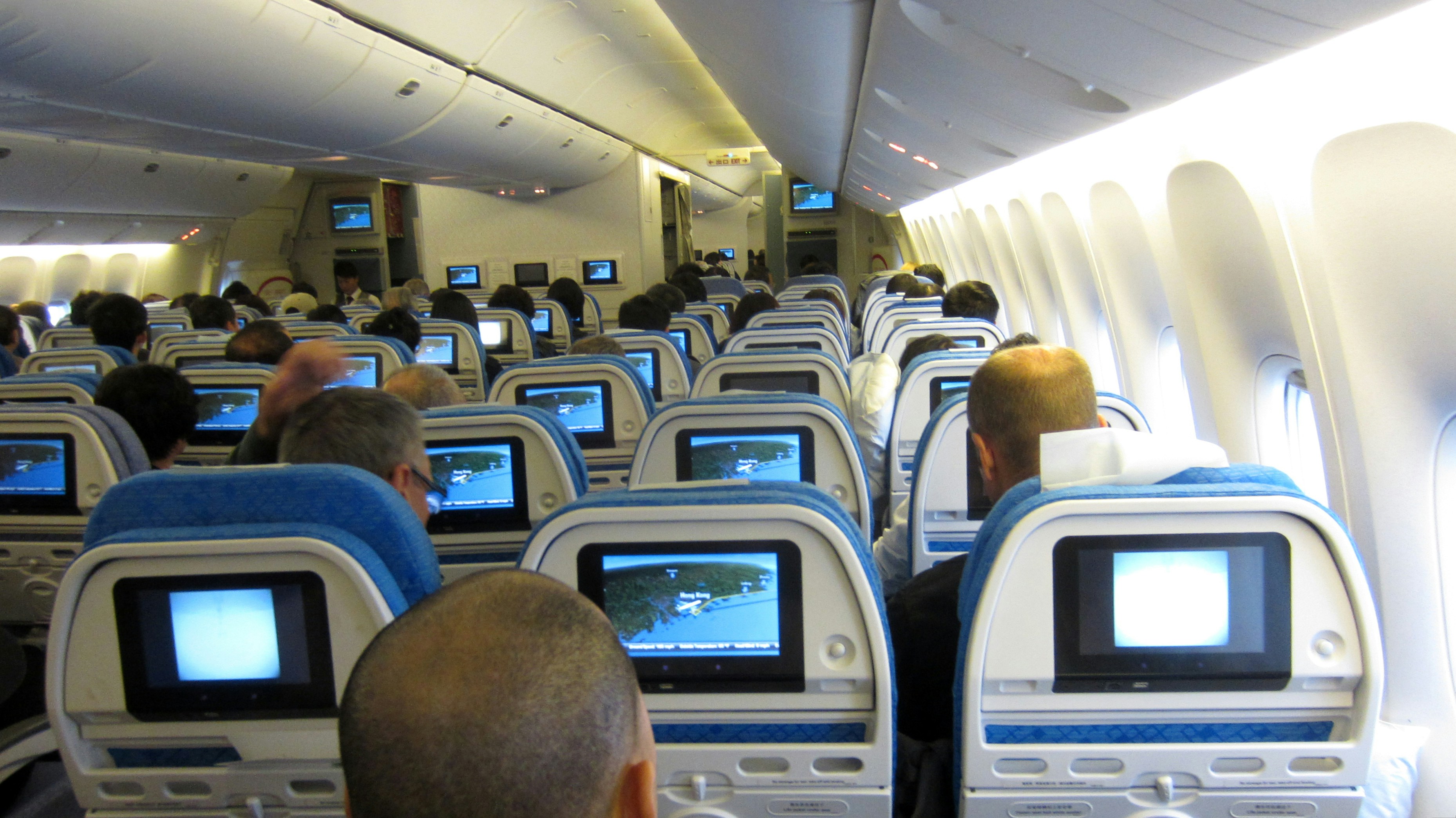 Mid-Cabin Tunnels: Screenslit Rows in Flight
