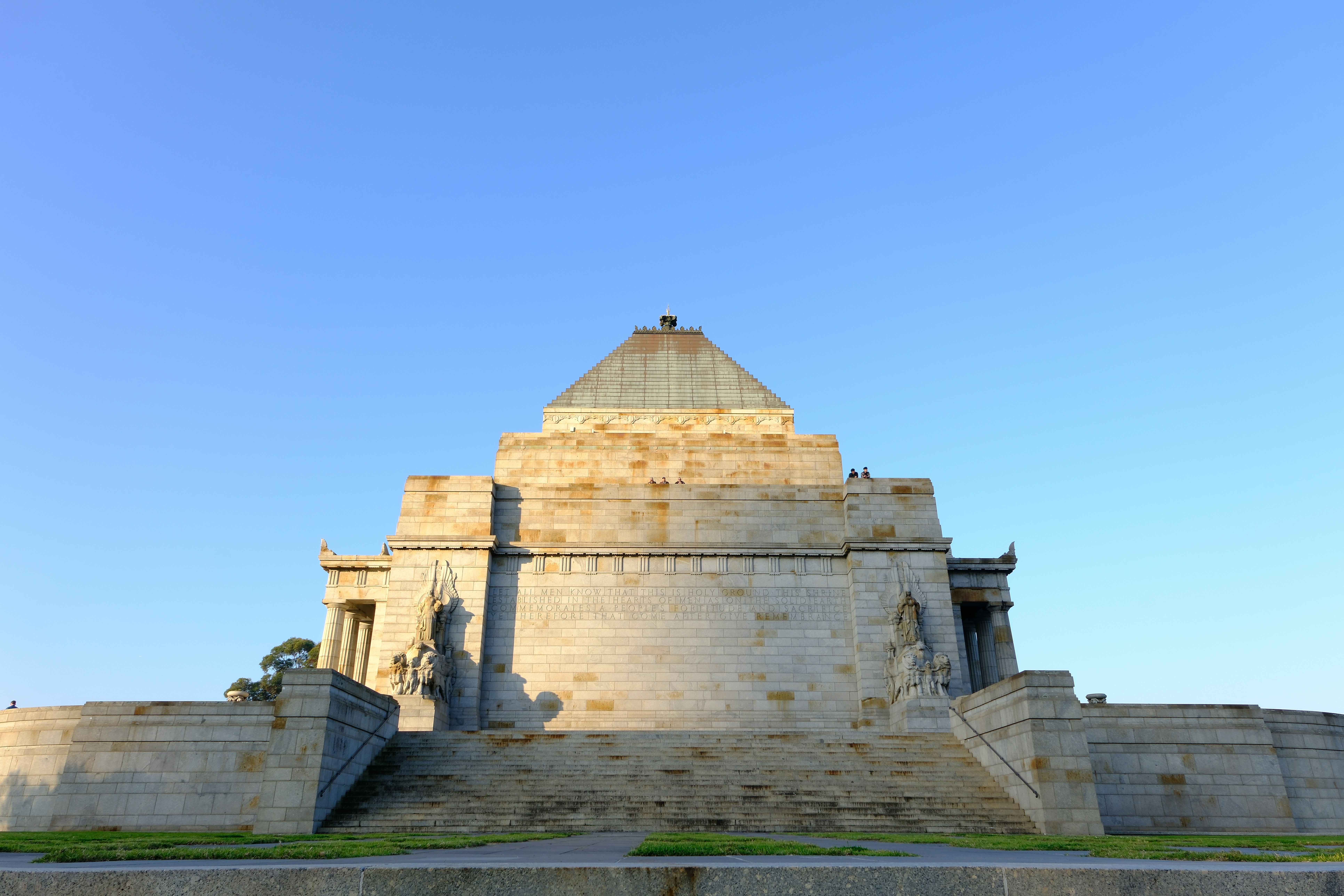 Terraced Monolith Under a Cerulean Sky
