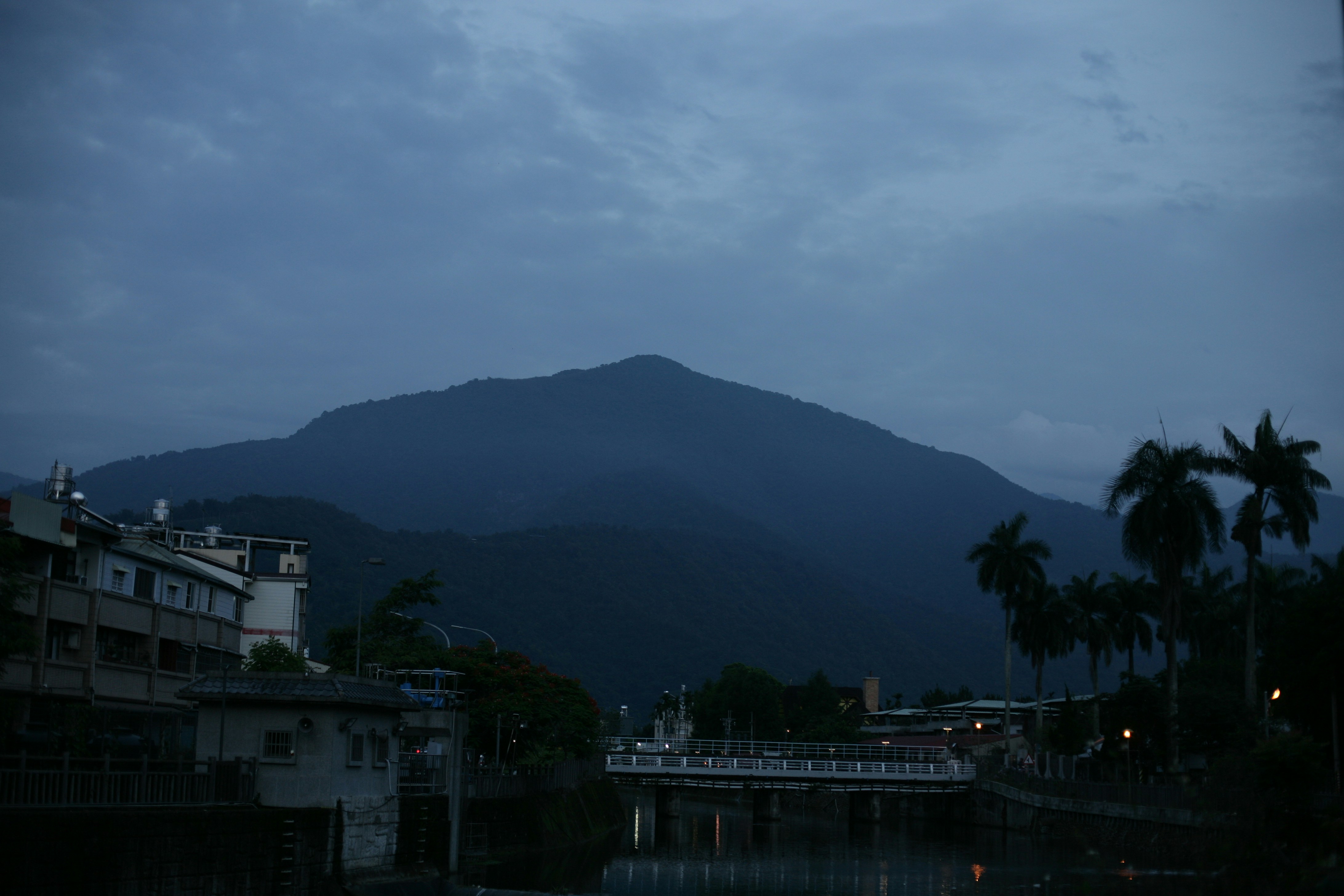 Veil of Dusk Over Mountainous Serenity