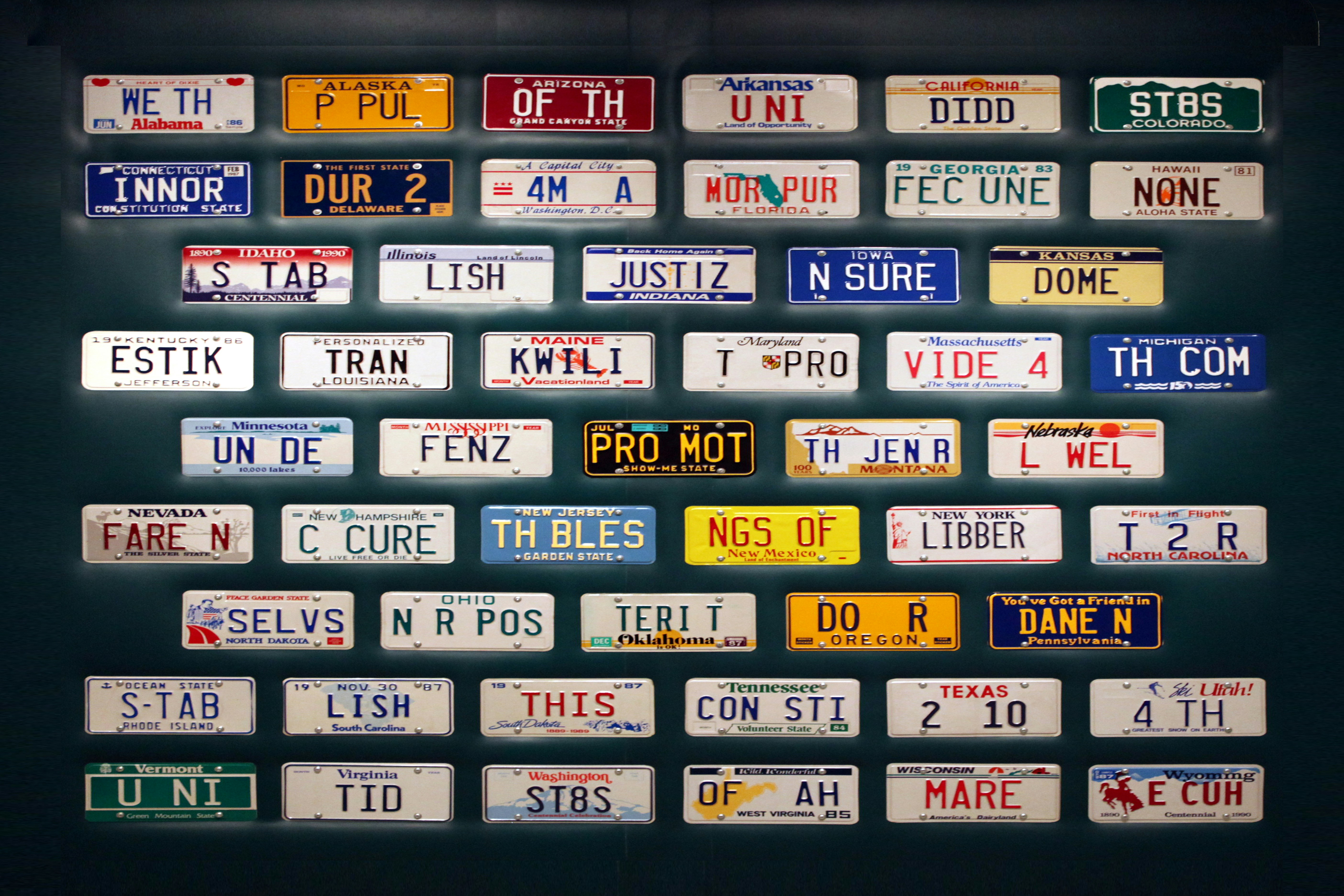 Mosaic of License Plates: A Wall of Distant Roads
