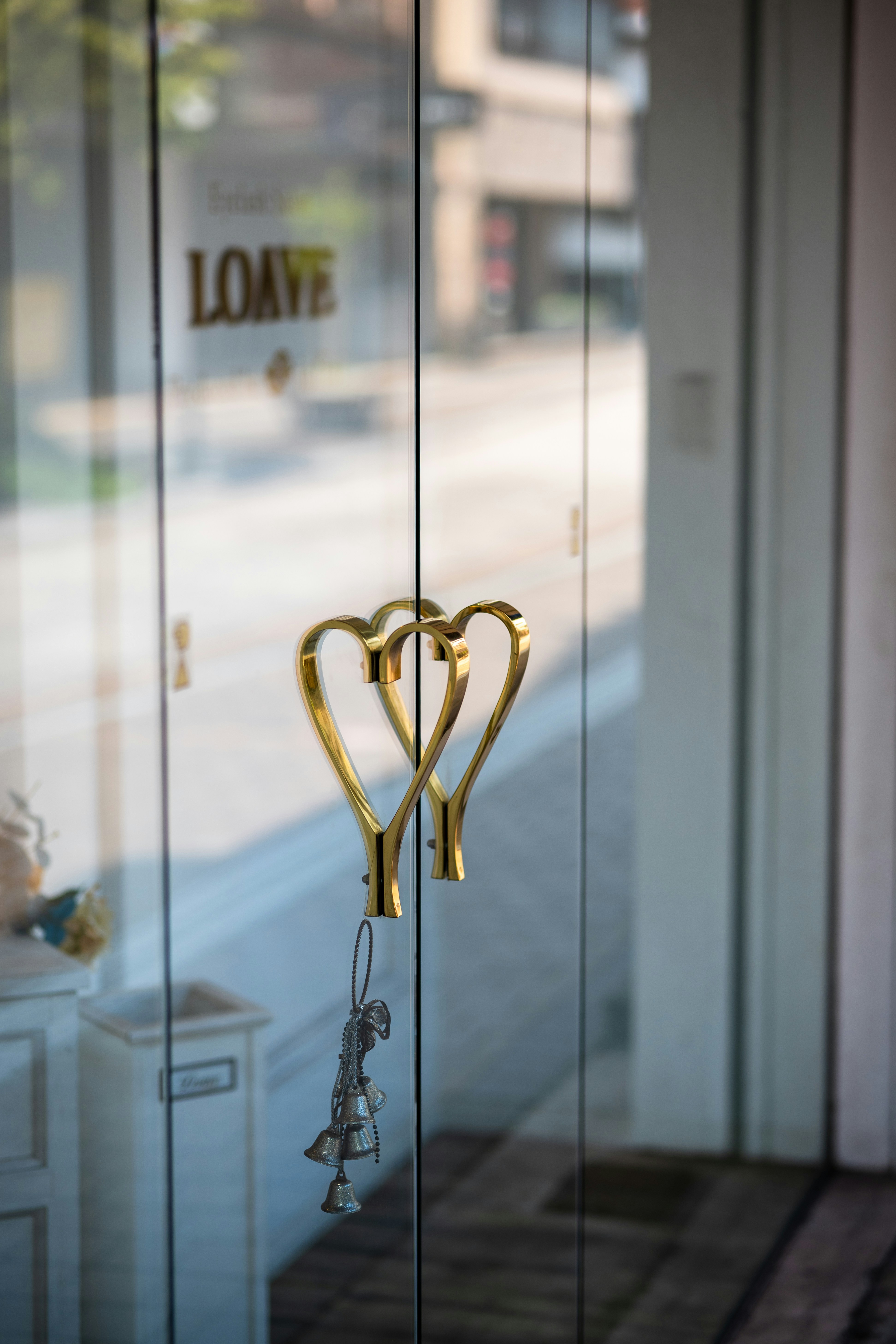 Golden Heart Door Knocker: Reflections and Echoes of a Storefront