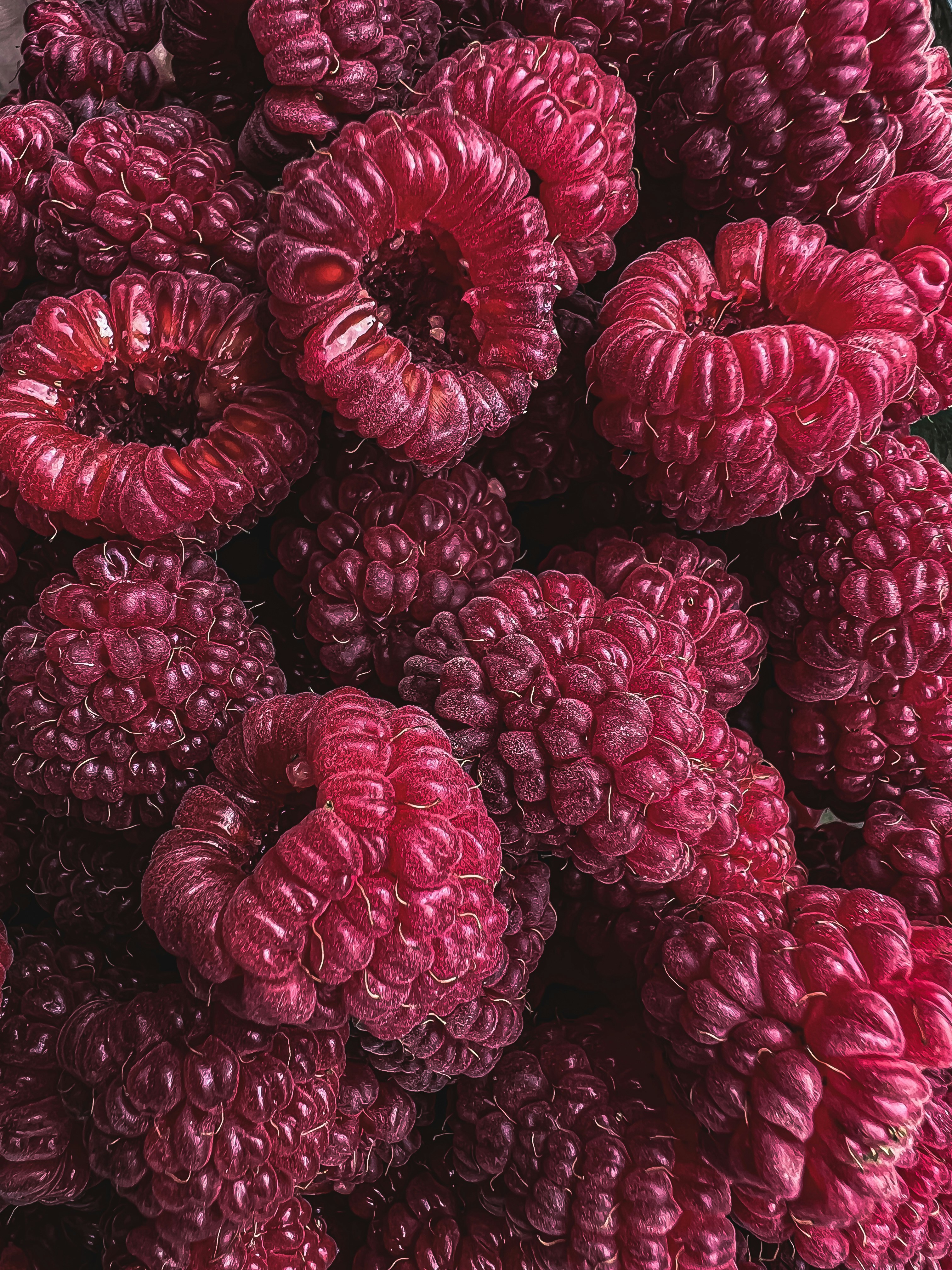 Crimson Velvet: A Macro Study of Raspberry Textures