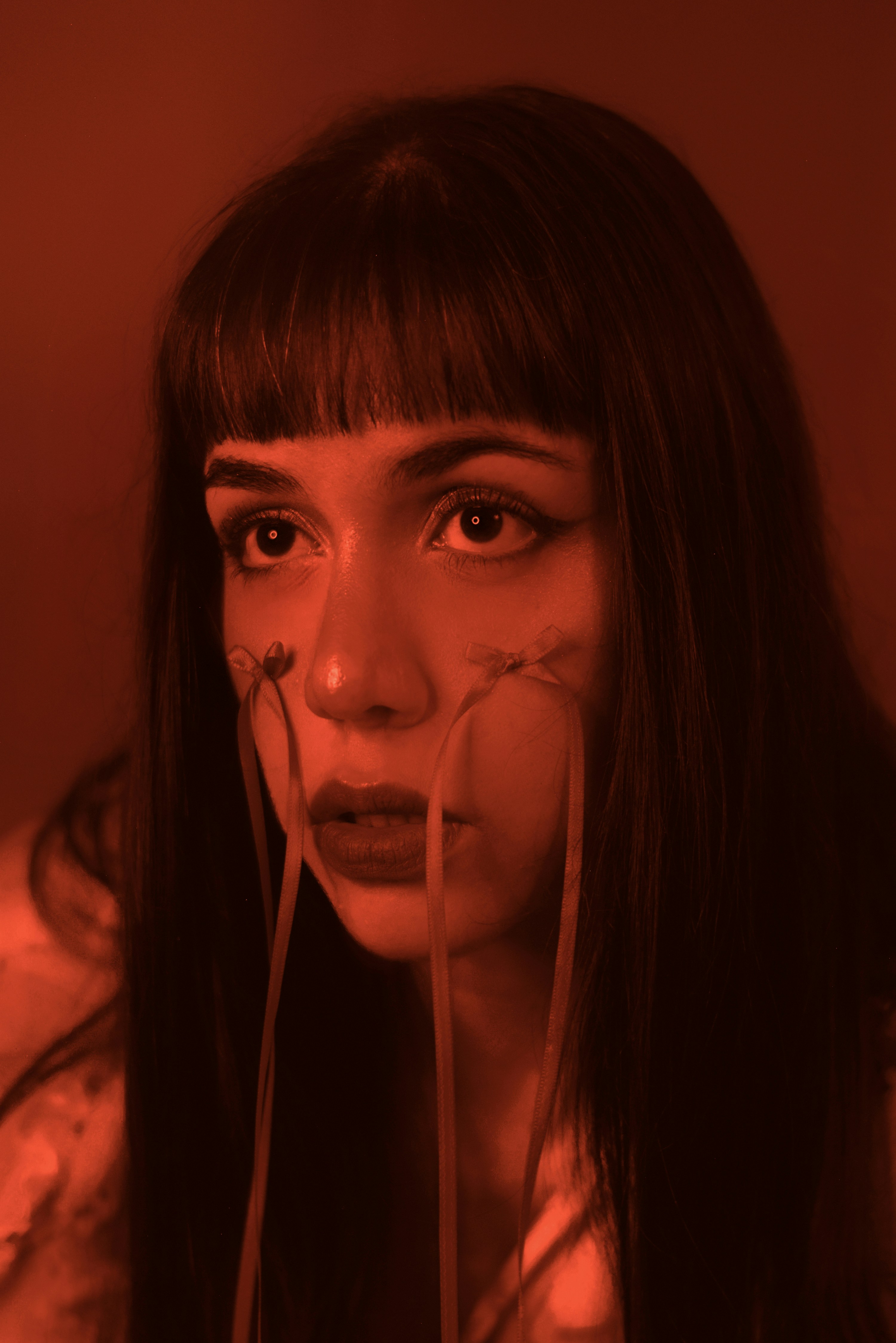 A woman with a creepy look on her face photo – Free Face Image on Unsplash