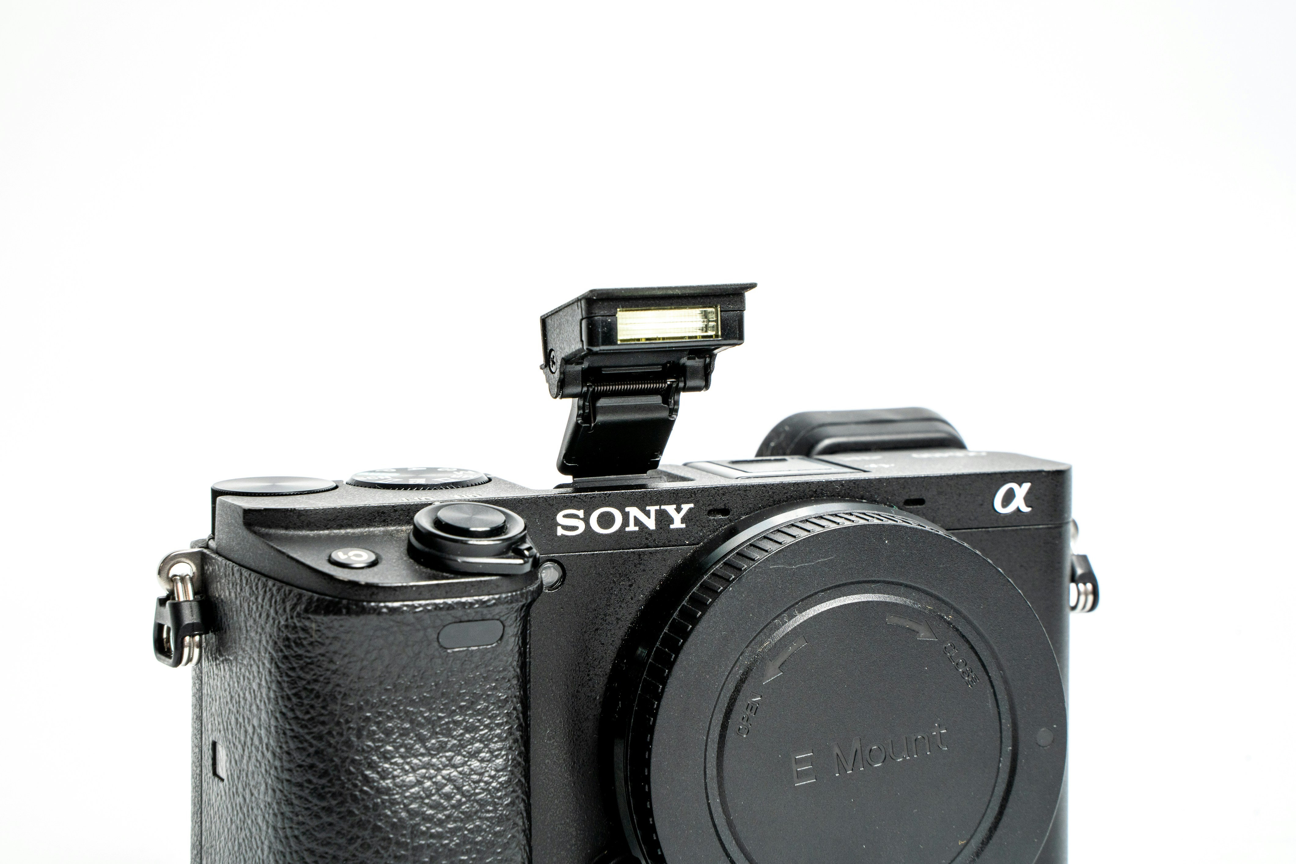 A camera with a flash light attached to it photo – Free Camera Image on ...