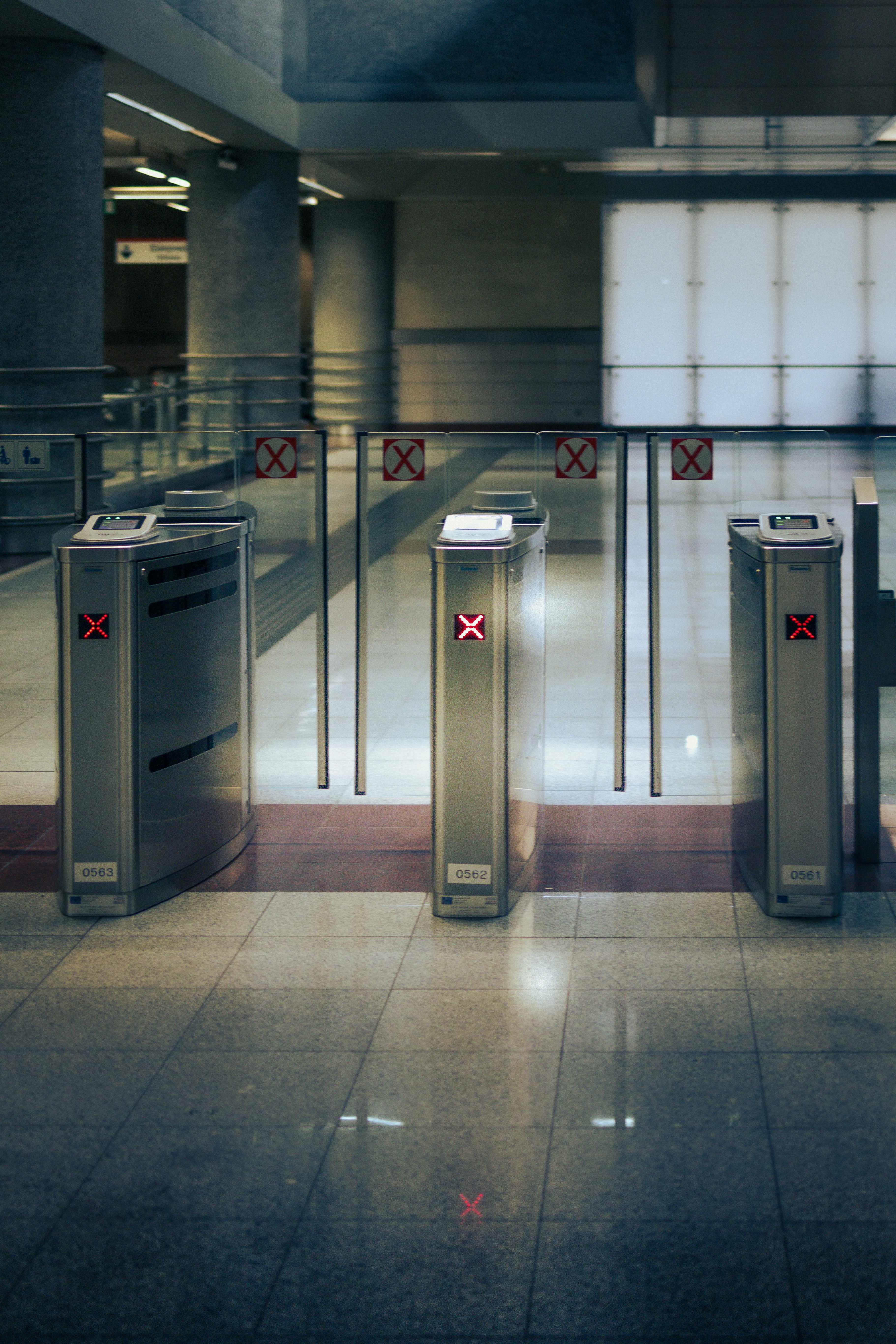 Red X Gatekeepers: Three Transit Barriers in a Quiet Station
