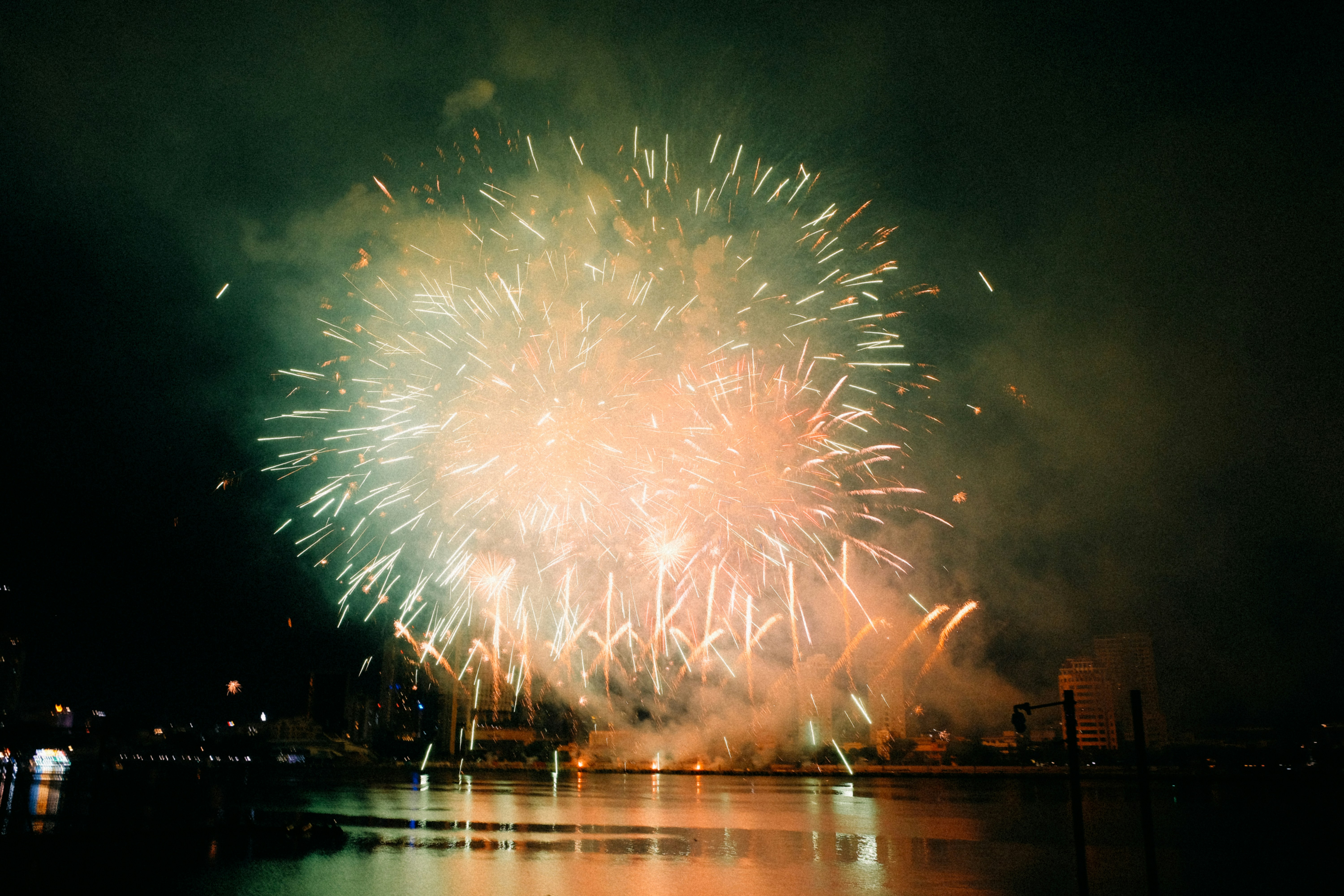 A large fireworks is lit up in the night sky photo – Free Fireworks ...