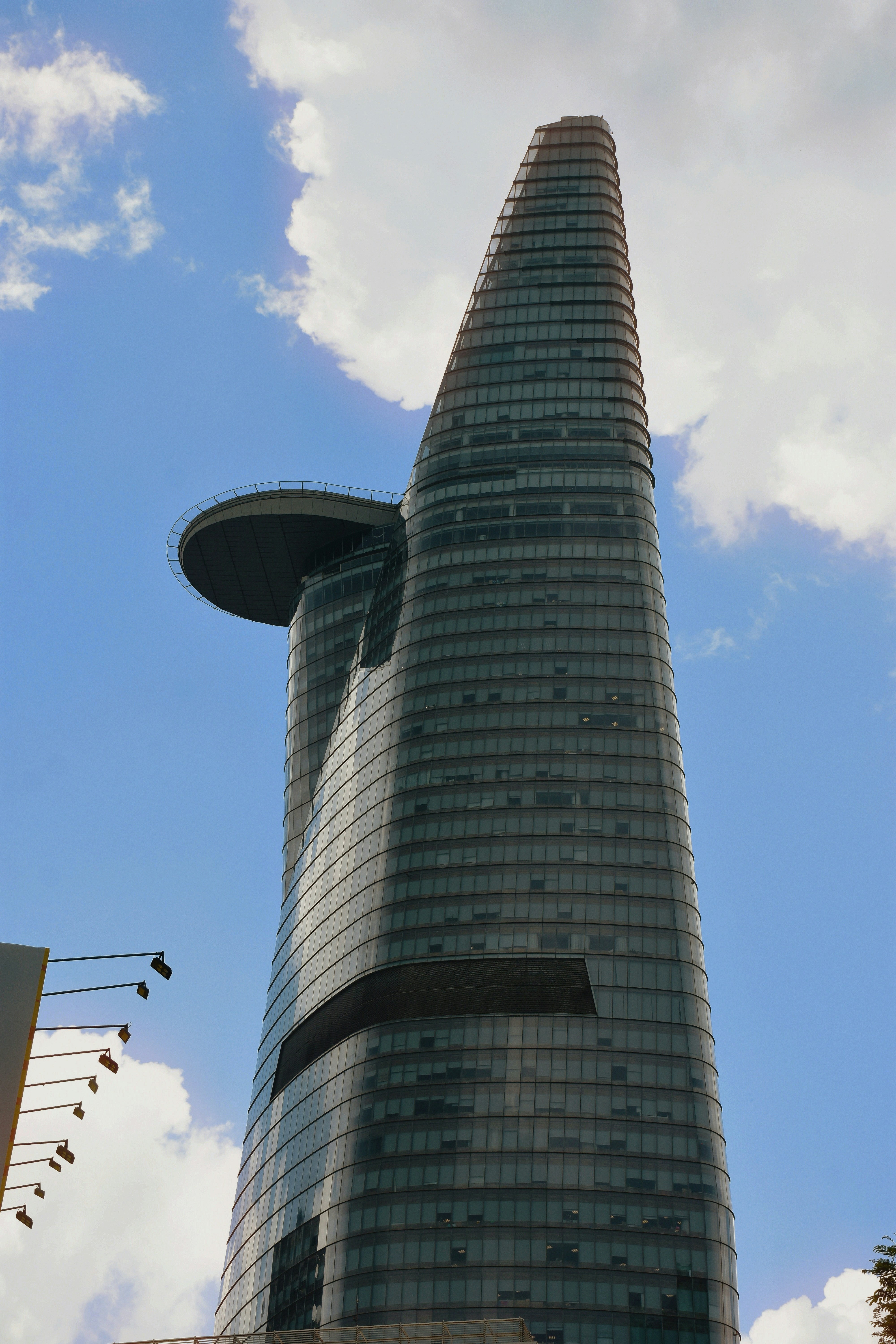 A very tall building with a sky background photo – Free Tower Image on ...