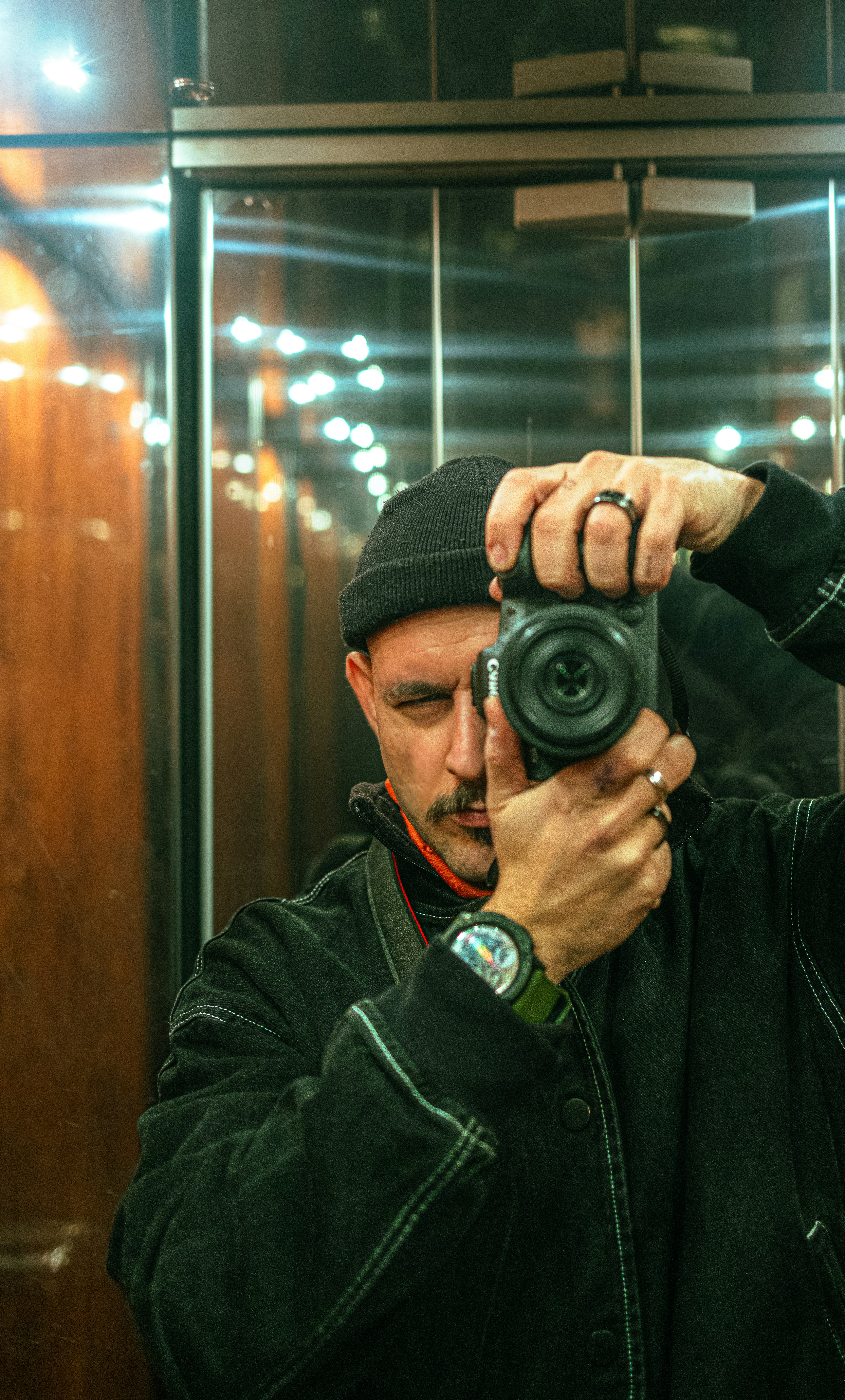 Mirror Behind the Lens: A Self-Portrait in a Glowing Elevator