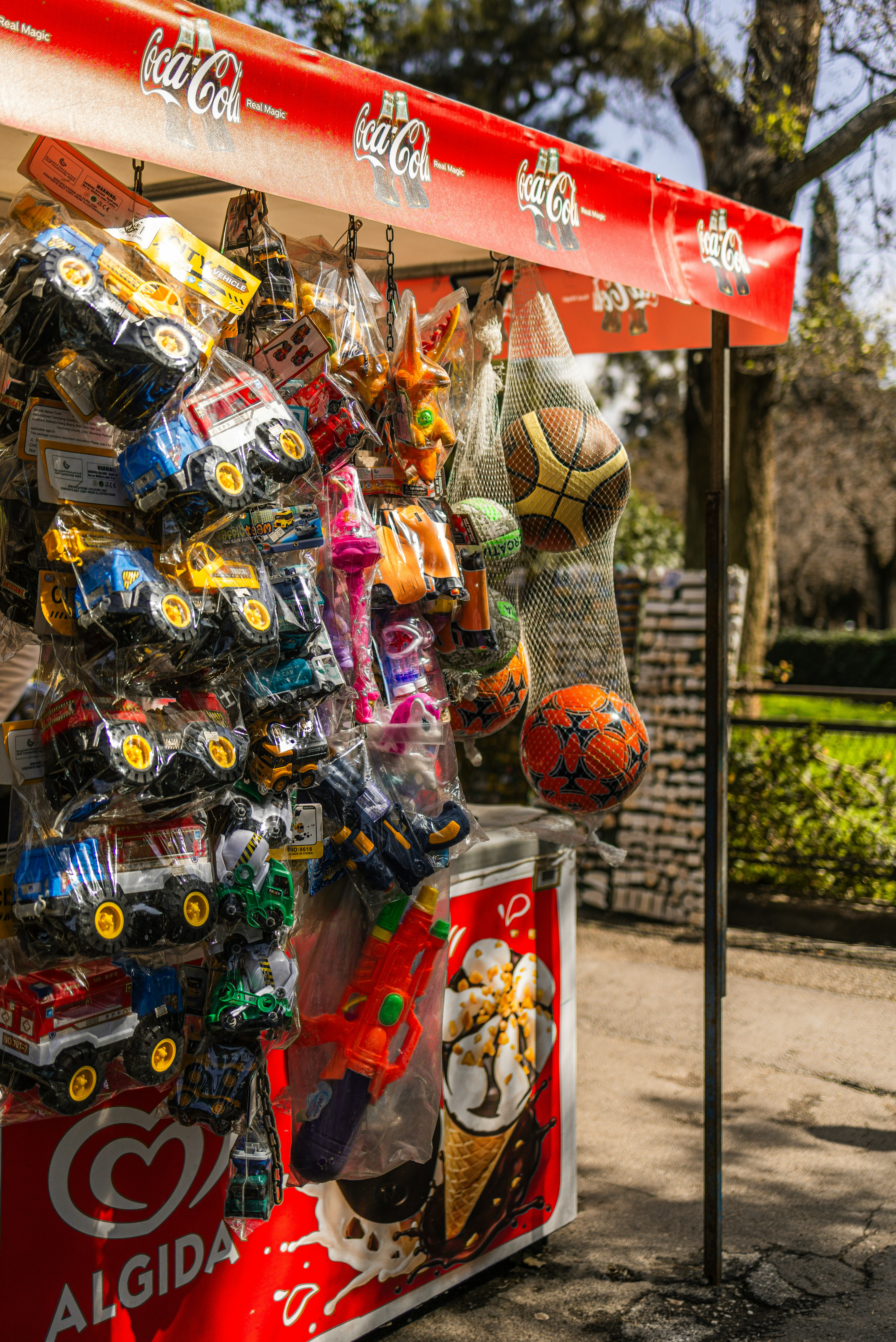 Under the Coca-Cola Canopy: A Burst of Toys and Balls