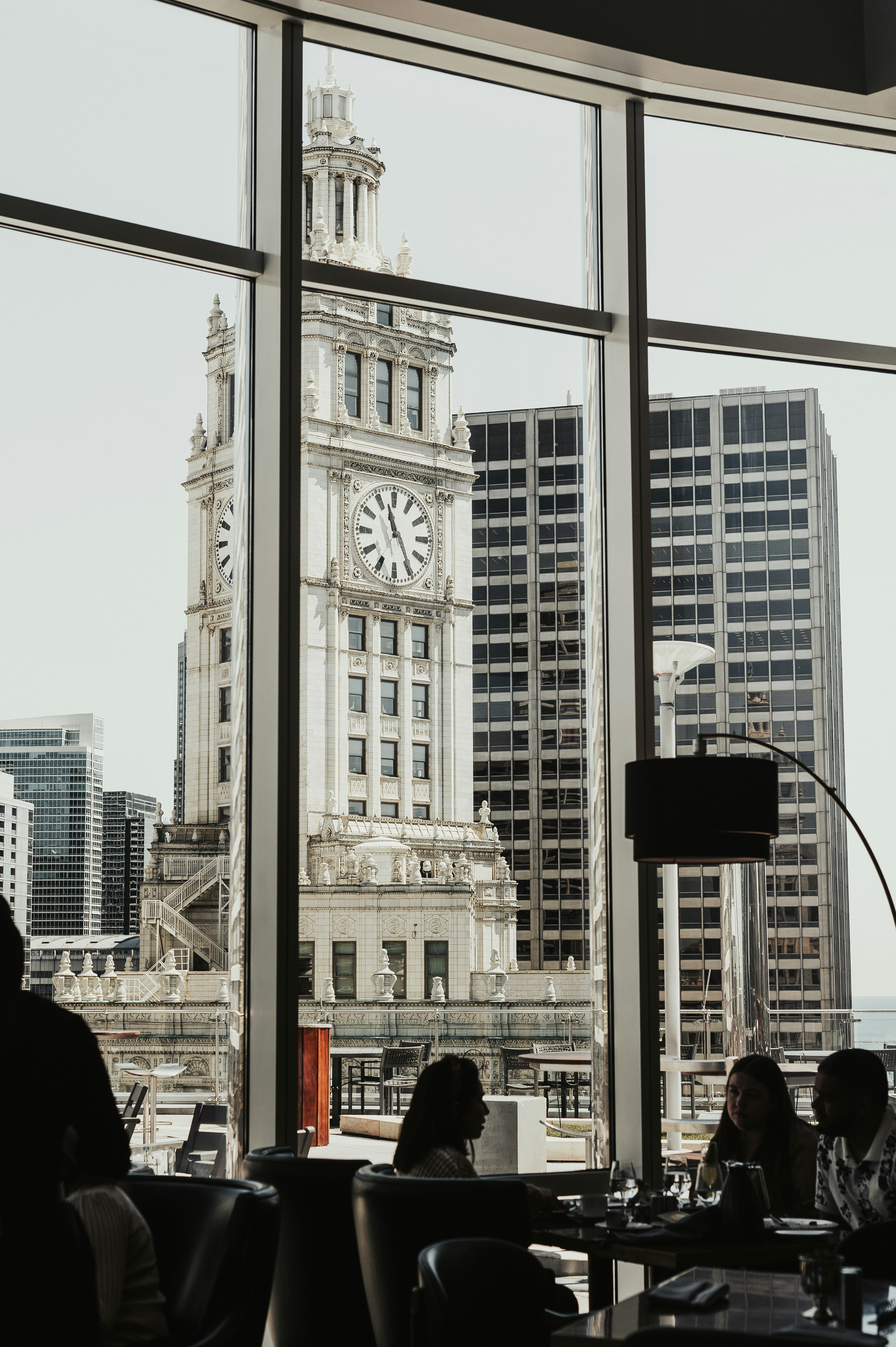 Inside the Skyline Café: Clocktower Vista Through a Curved Window