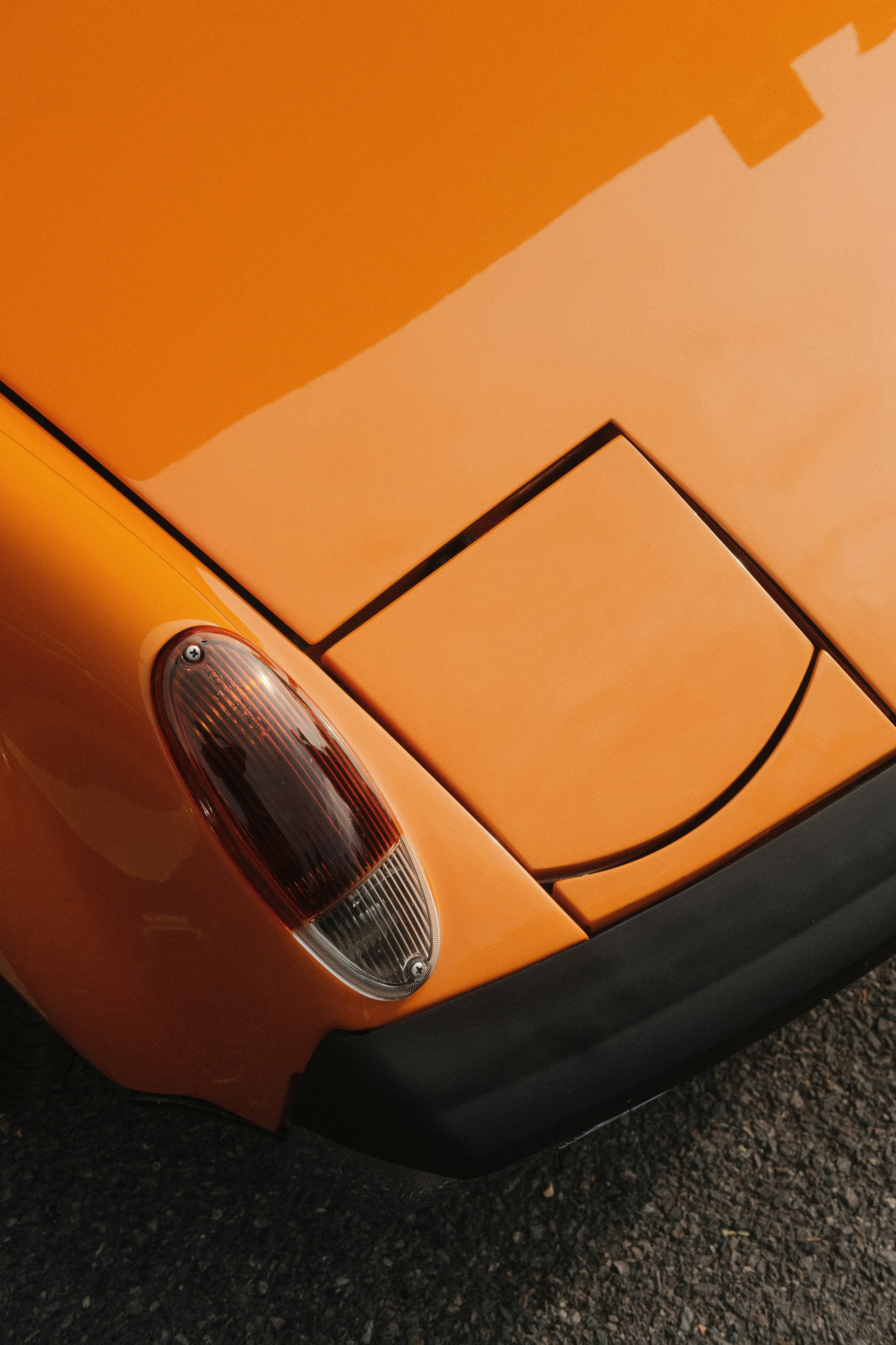 A close up of the front of an orange sports car photo – Free Headlight ...