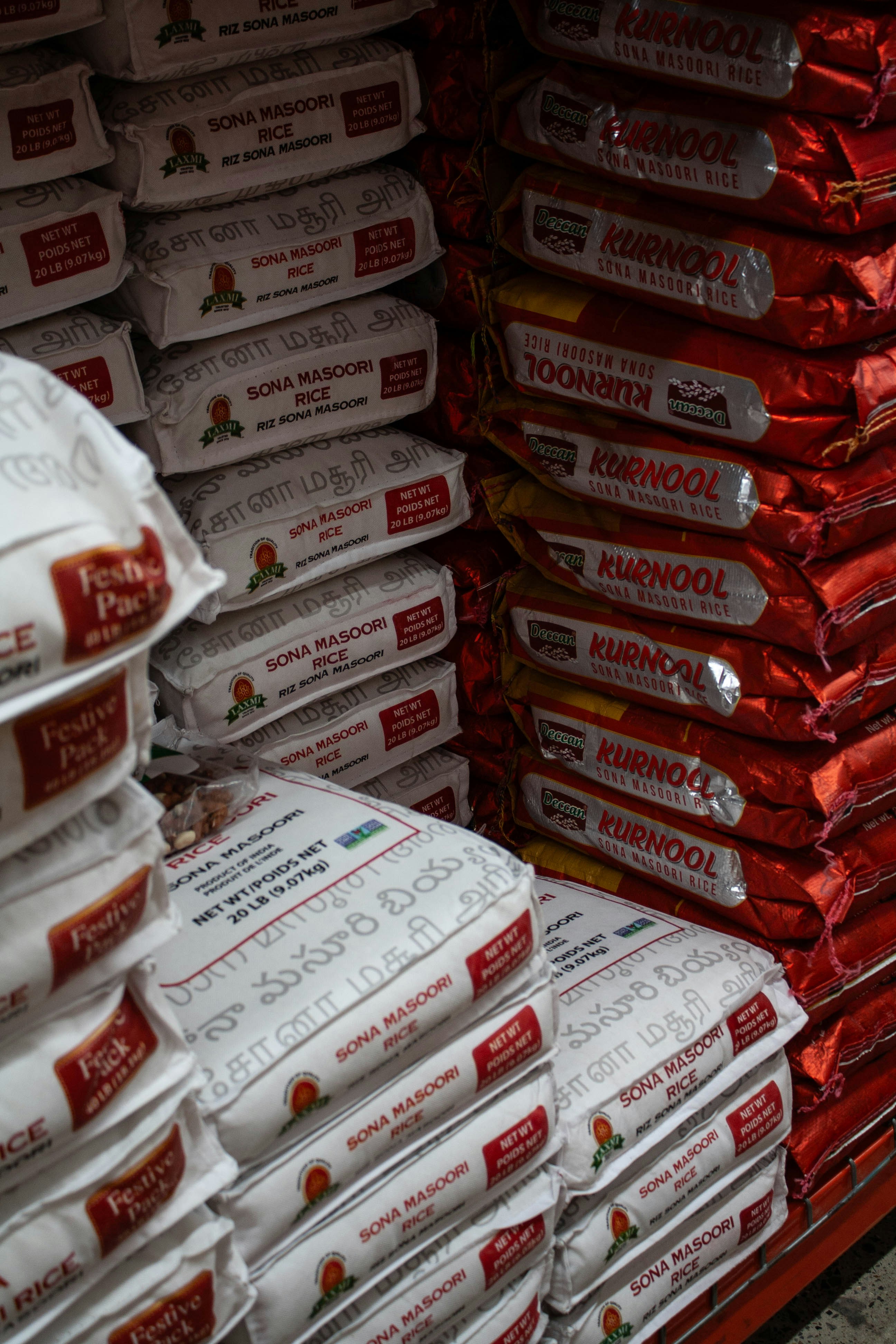 A pile of red packets sitting on top of a shelf photo – Free Rice Image ...