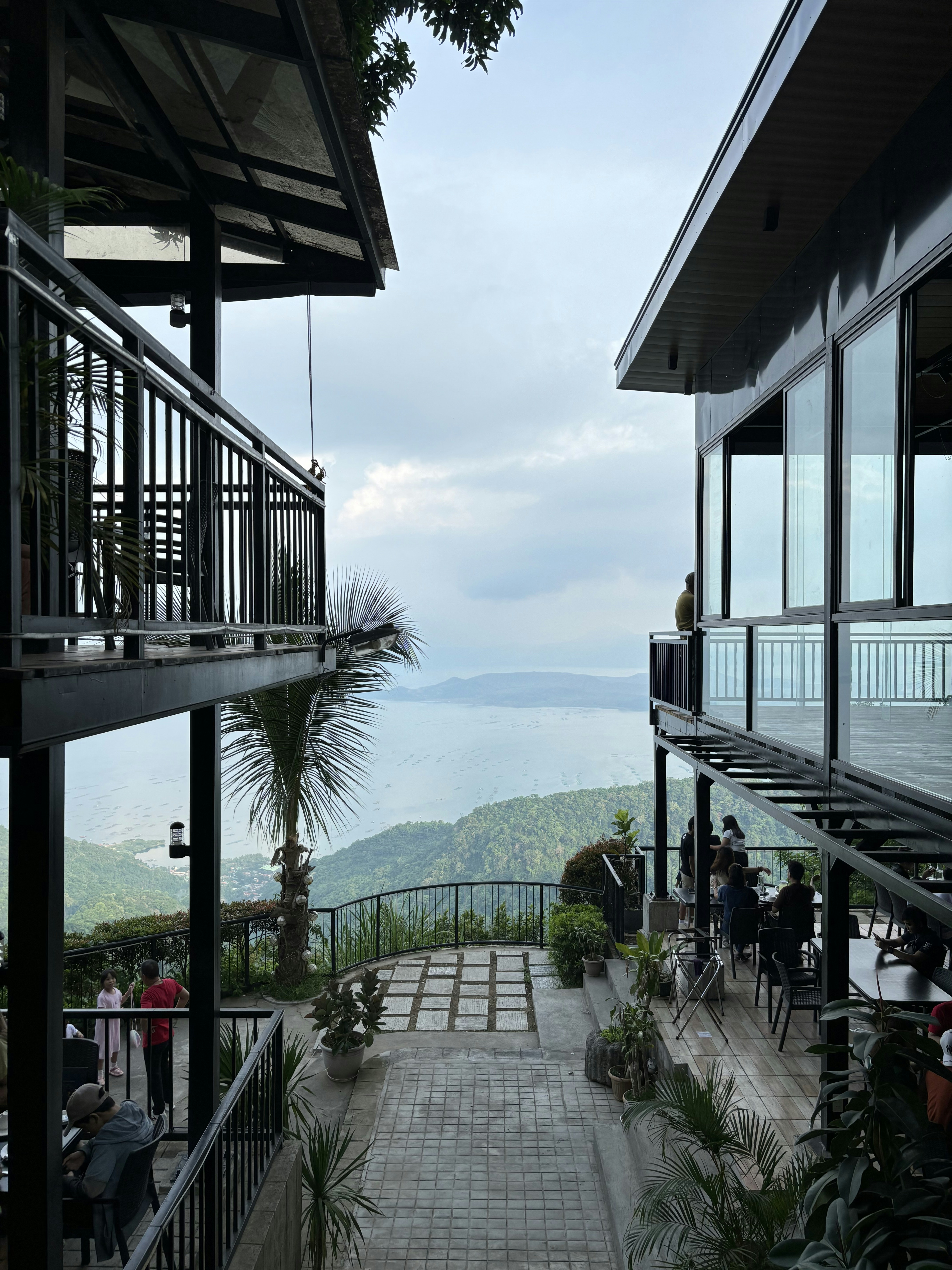 A group of people standing outside of a building photo – Free Scenery ...